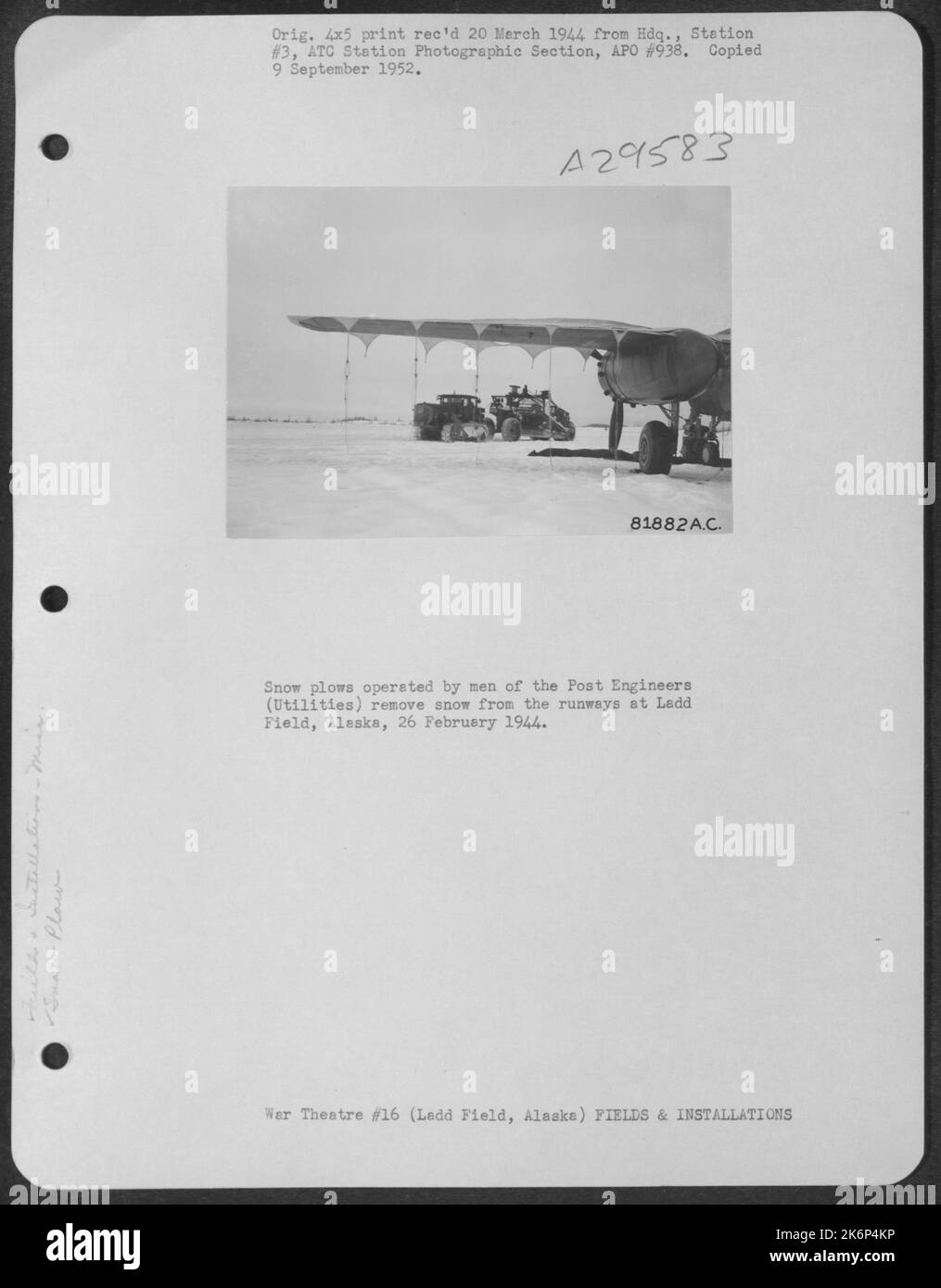 Snow plows operated by men of the Post Engineers (Utilities) remove ...