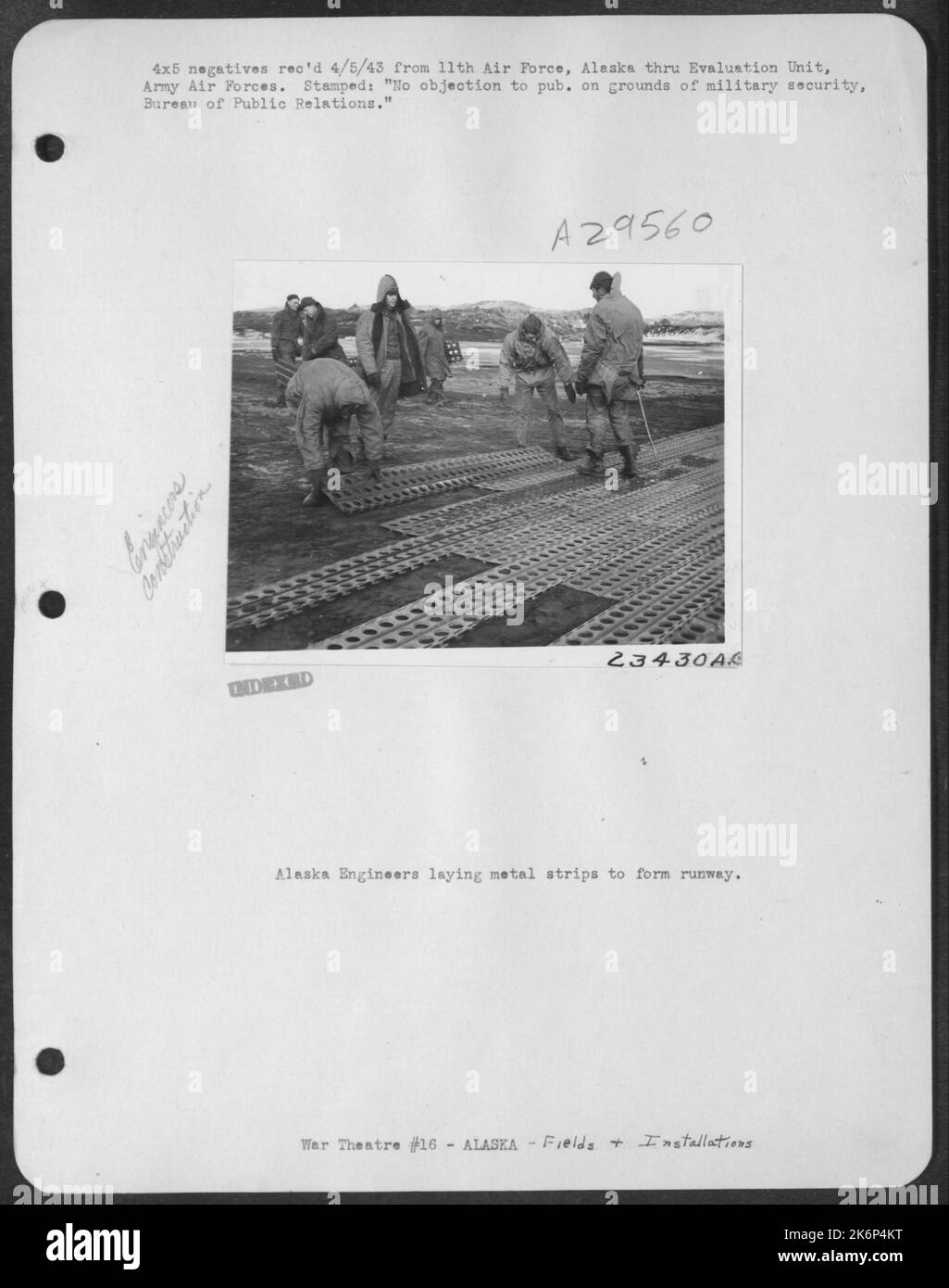 Alaska Engineers laying metal strips to form runway Stock Photo - Alamy