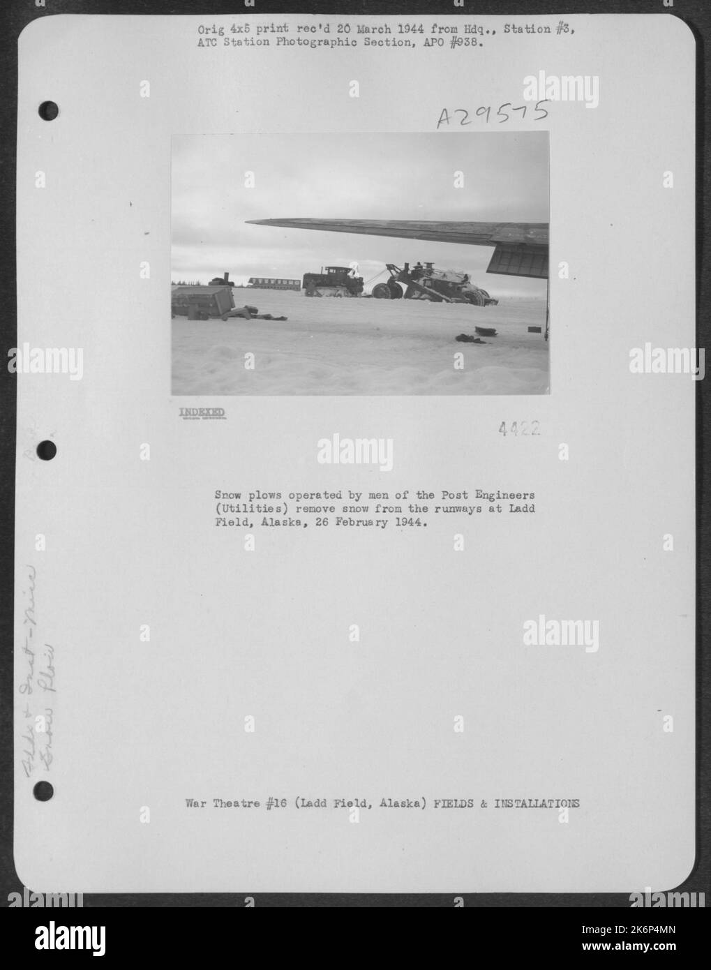 Snow plows operated by men of the Post Engineers (Utilities) remove ...