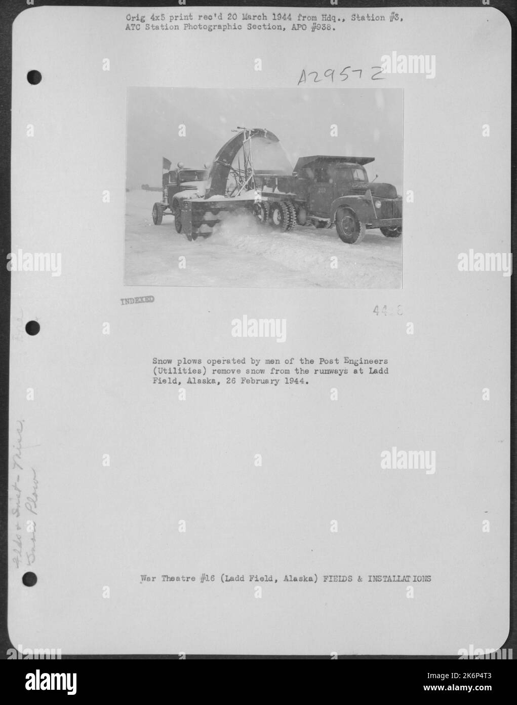 Snow plows operated by men of the Post Engineers (Utilities) remove ...