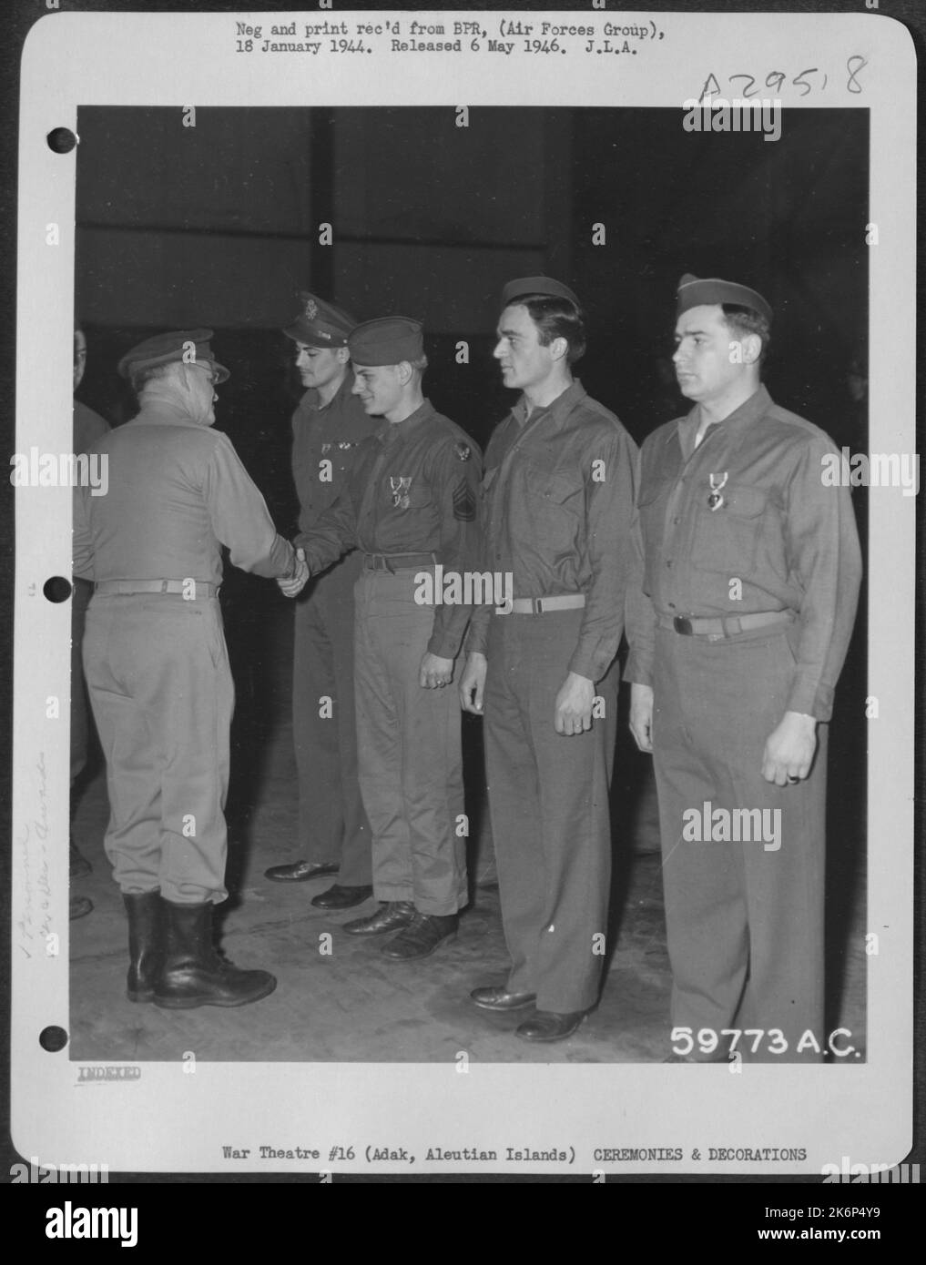 General Davenport Davis awarding the Oak Leaf Cluster to the Air Medal ...