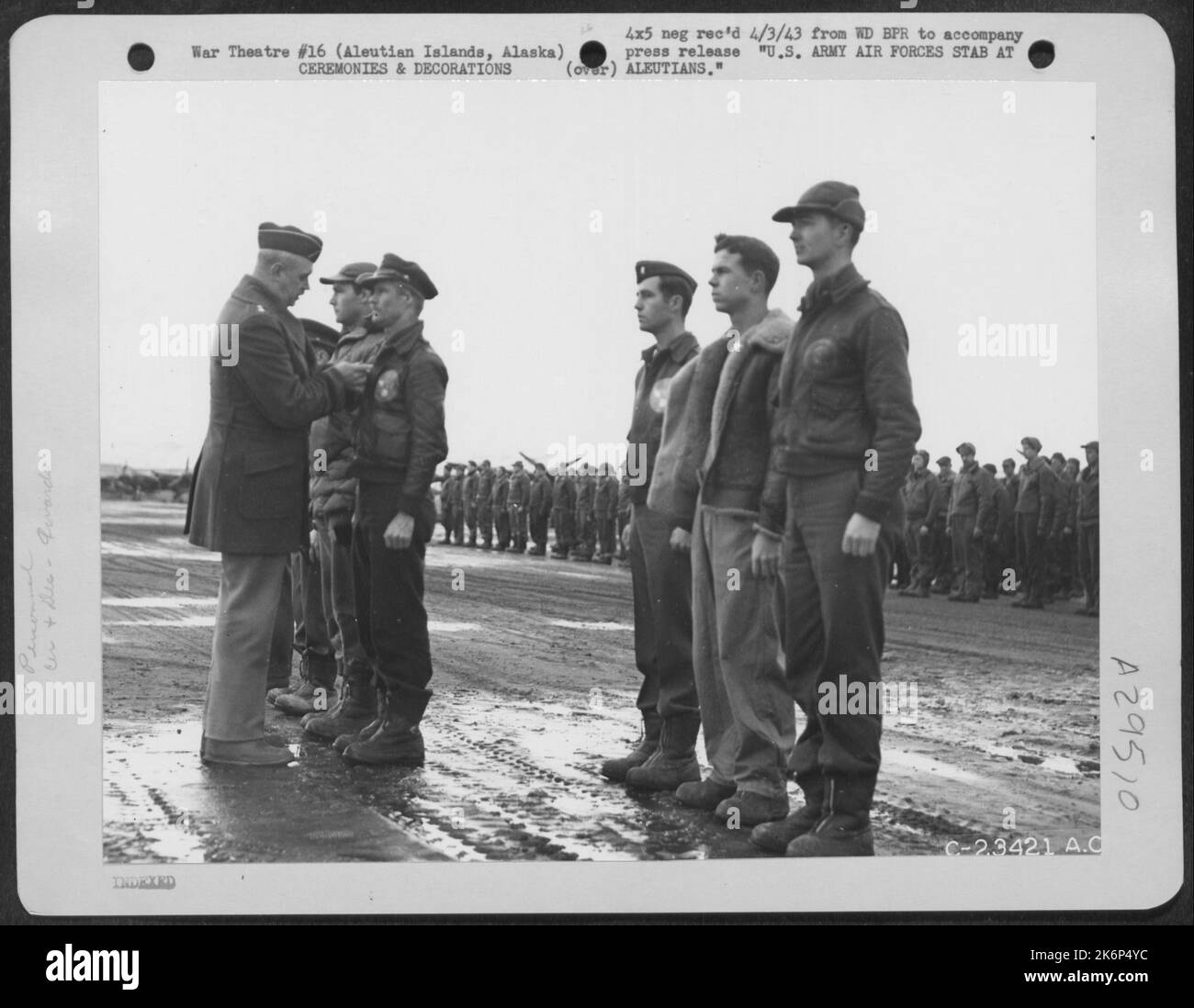Major General William O. Butler, Commanding 11th U.S. Air Force, awards ...