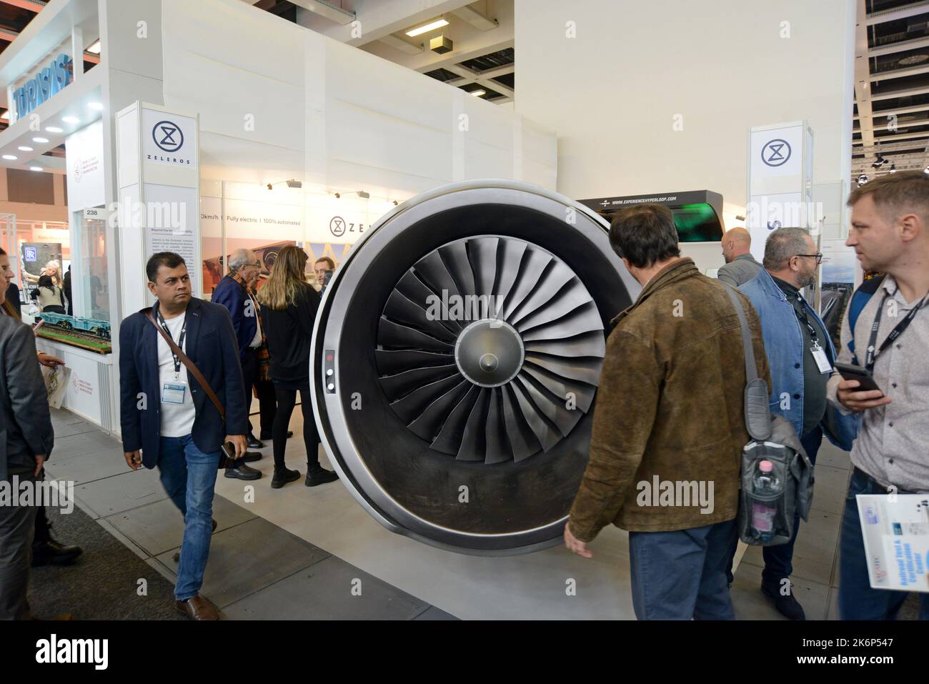 People examining the mock up model of a Zeleros Hyperloop concept ...