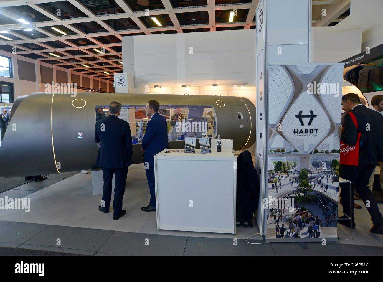 People examining the mock up model of a Zeleros Hyperloop concept ...