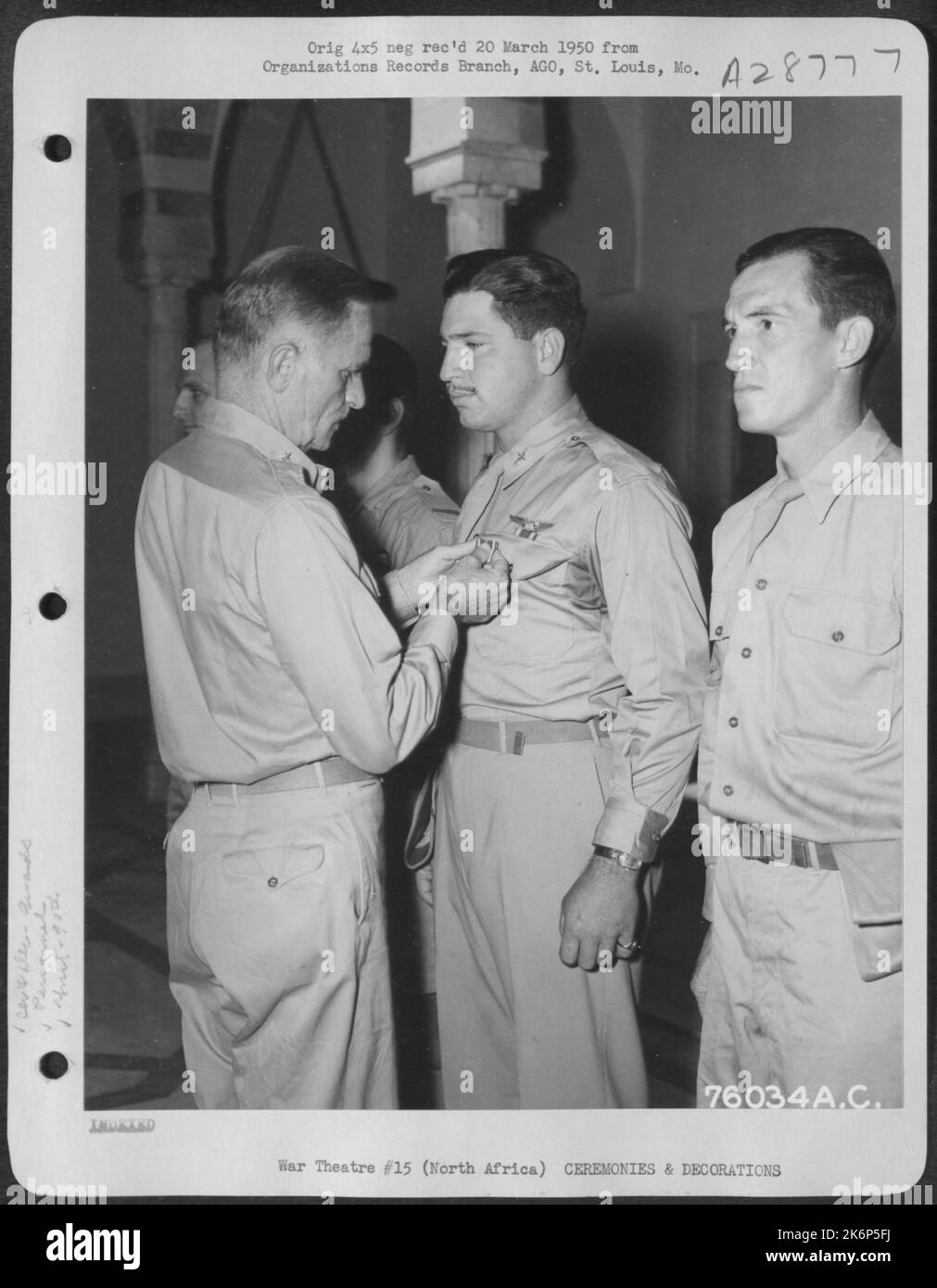 Lt. General Carl A. Spaatz presents an award to Lt. Webb of the 90th ...
