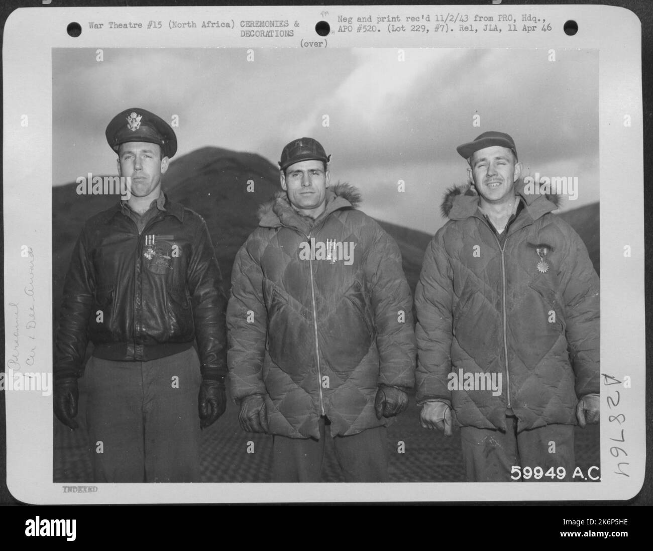 Three pilots received medals in North Africa. Left to right: Capt ...