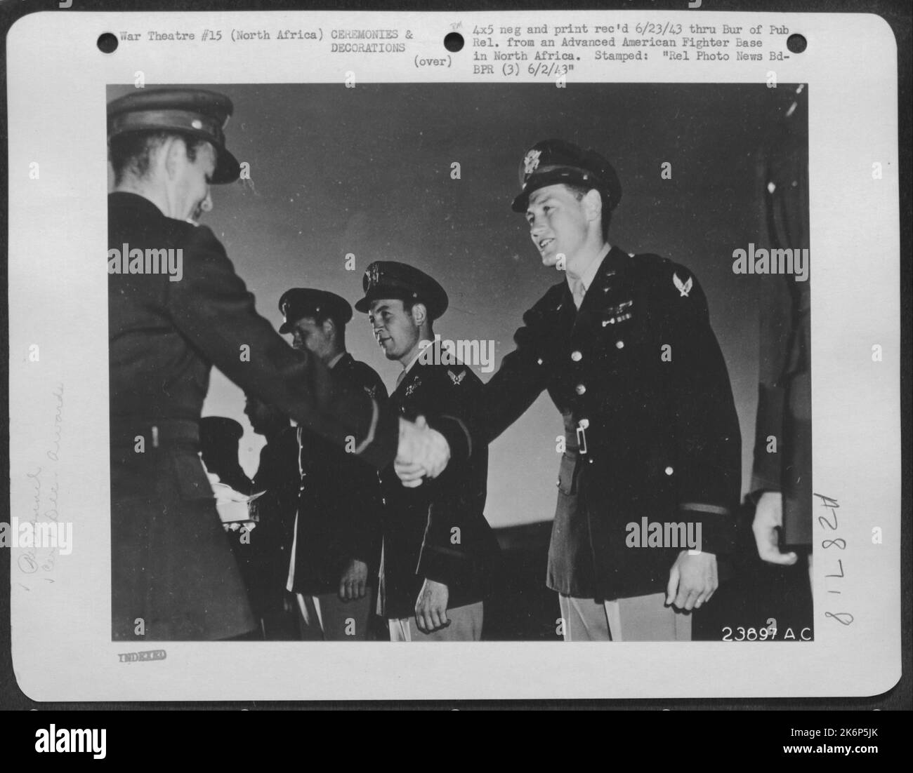 Shown above is 2nd Lt. William J. Sloan, Richmond, Va., receiving the ...