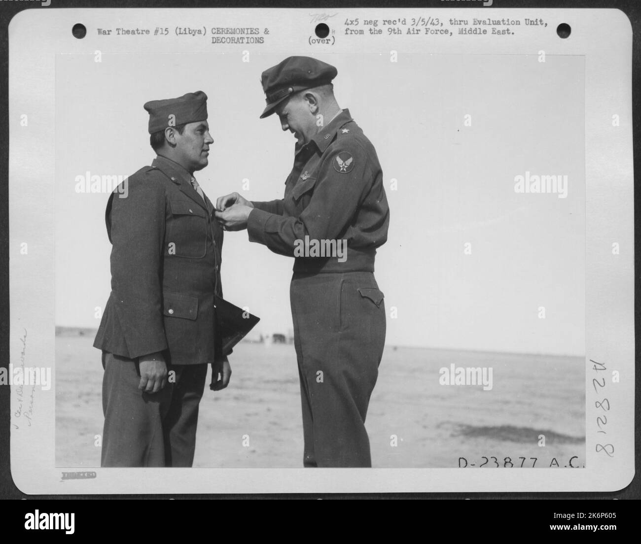 Sgt. Henry J. Klapperich, Portland, Oregon, being awarded the Air Medal ...