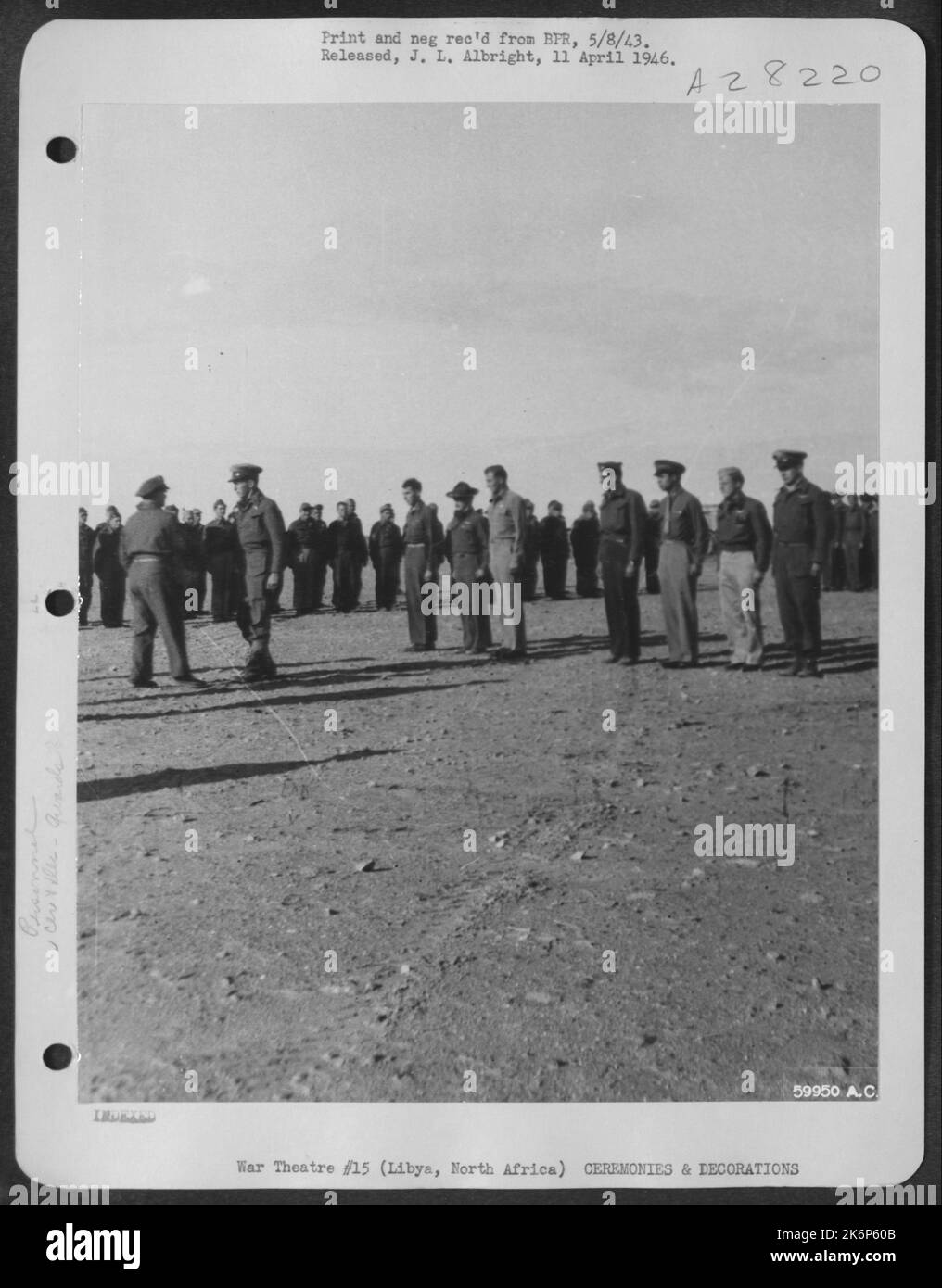 Capt. R.A. Barnum of the 64th Fighter Squadron shaking hands with Maj ...