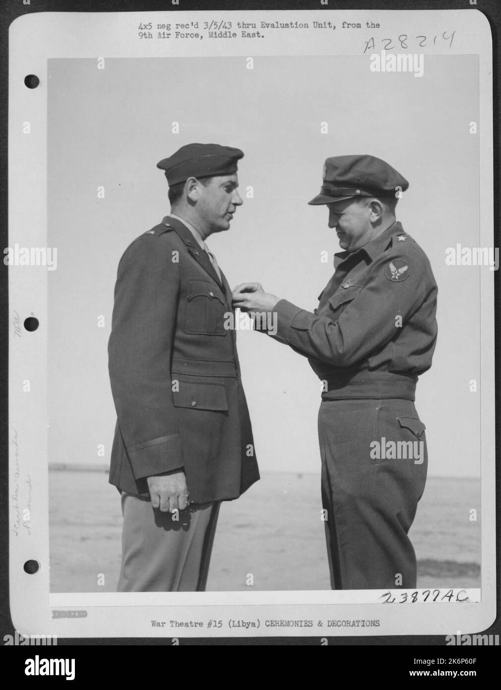 2nd Lt. John S. Young, Dallas, Texas being presented the Air Medal by ...