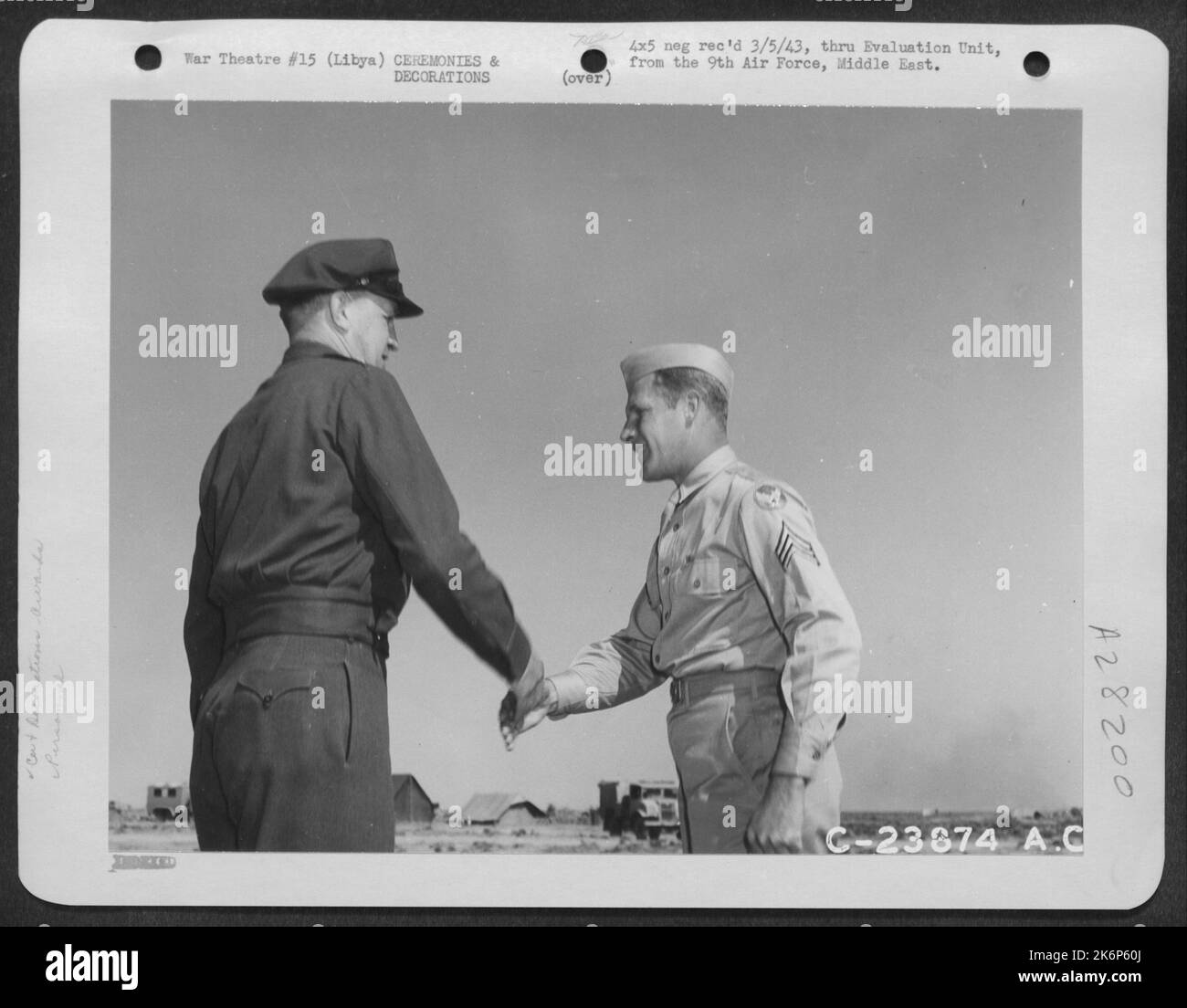 Sgt. Joseph H. Hart, Atlanta, Ga., being congratulated by Brig. General ...