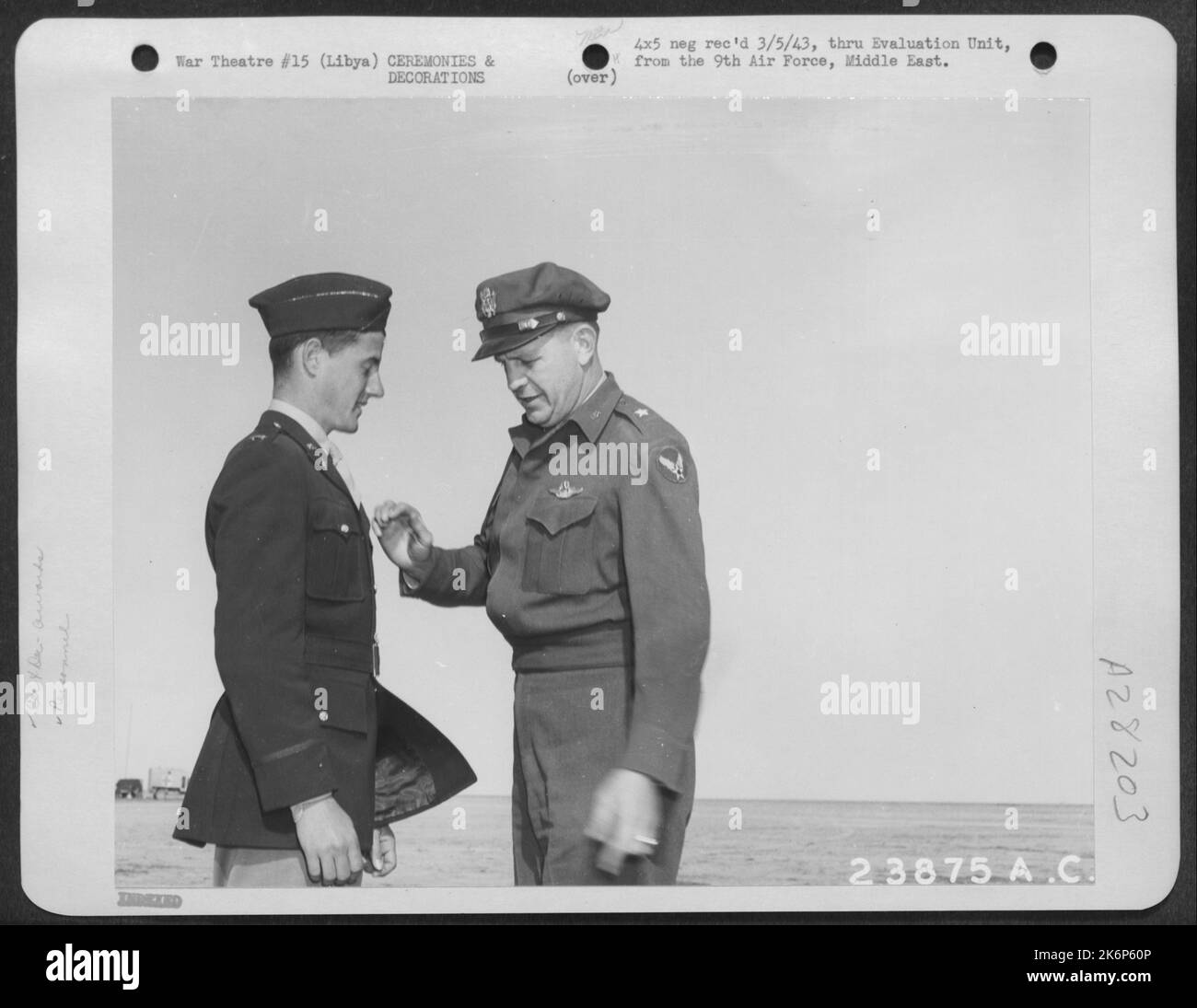 2nd Lt. Robert L. Eaton, Reedeley, Calif. Being presented the Air Medal ...