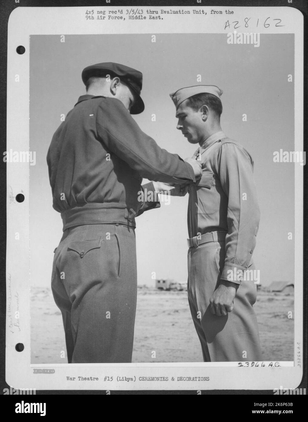 2nd Lt. John G. Lynch, Humboldt, Nebraska being presented the Air Medal ...