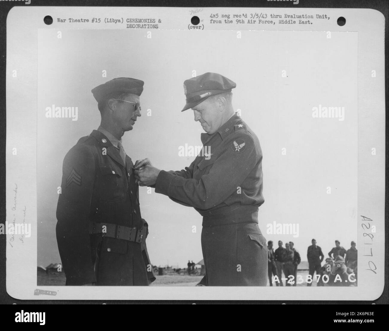 S/Sgt. Tom J. Harling, Houston, Texas being awarded the Air Medal by ...