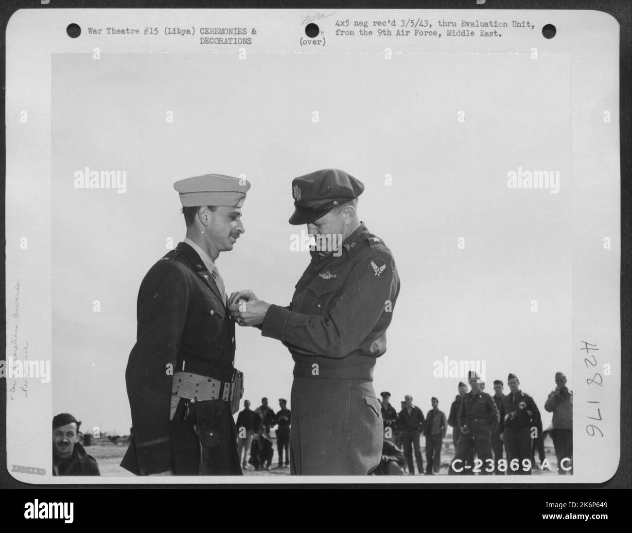 2nd Lt. Monroe B. Schwartz, Phildelphia, Pa., being awarded the Purple ...