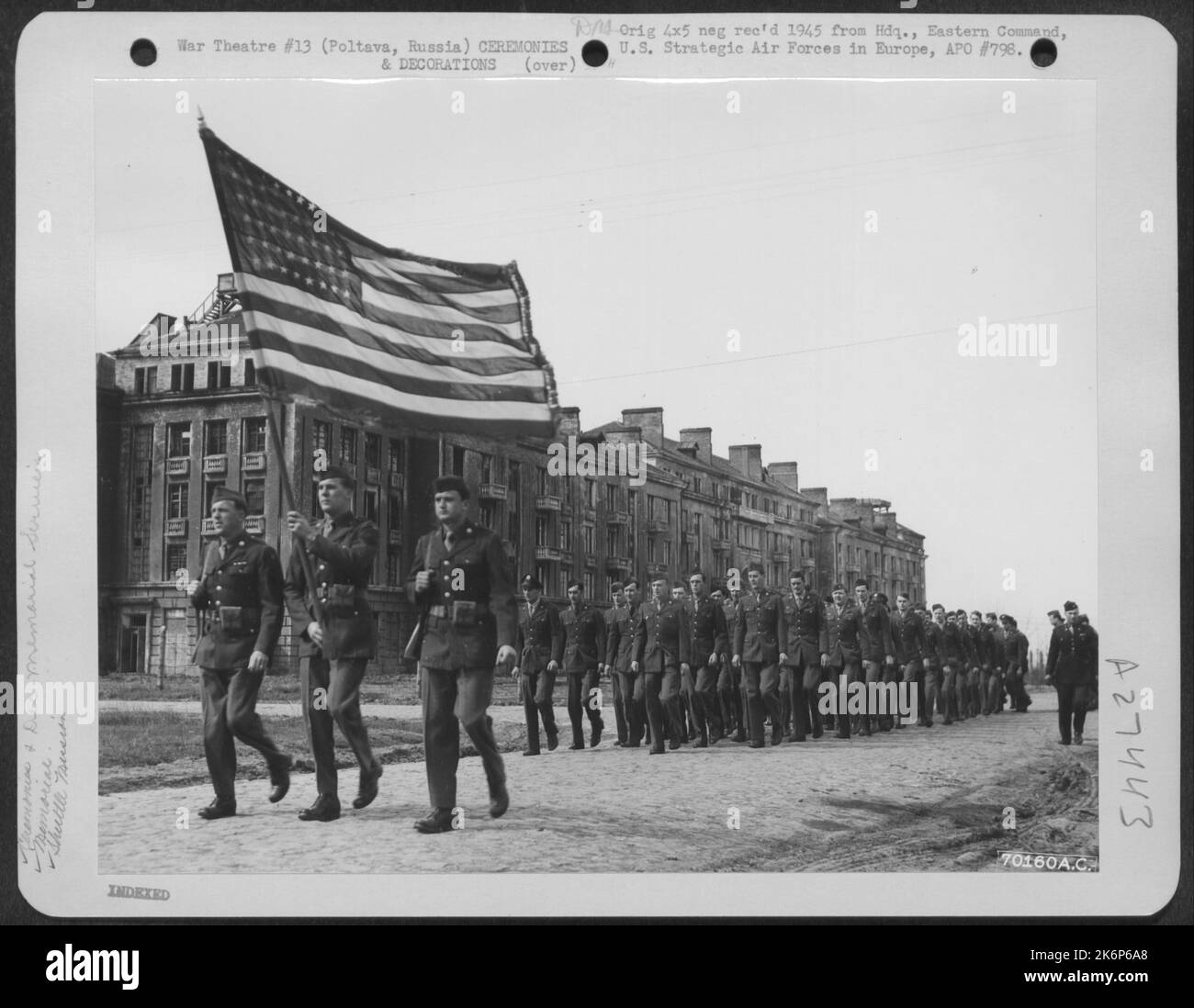 American military personnel march to the building where memorial ...
