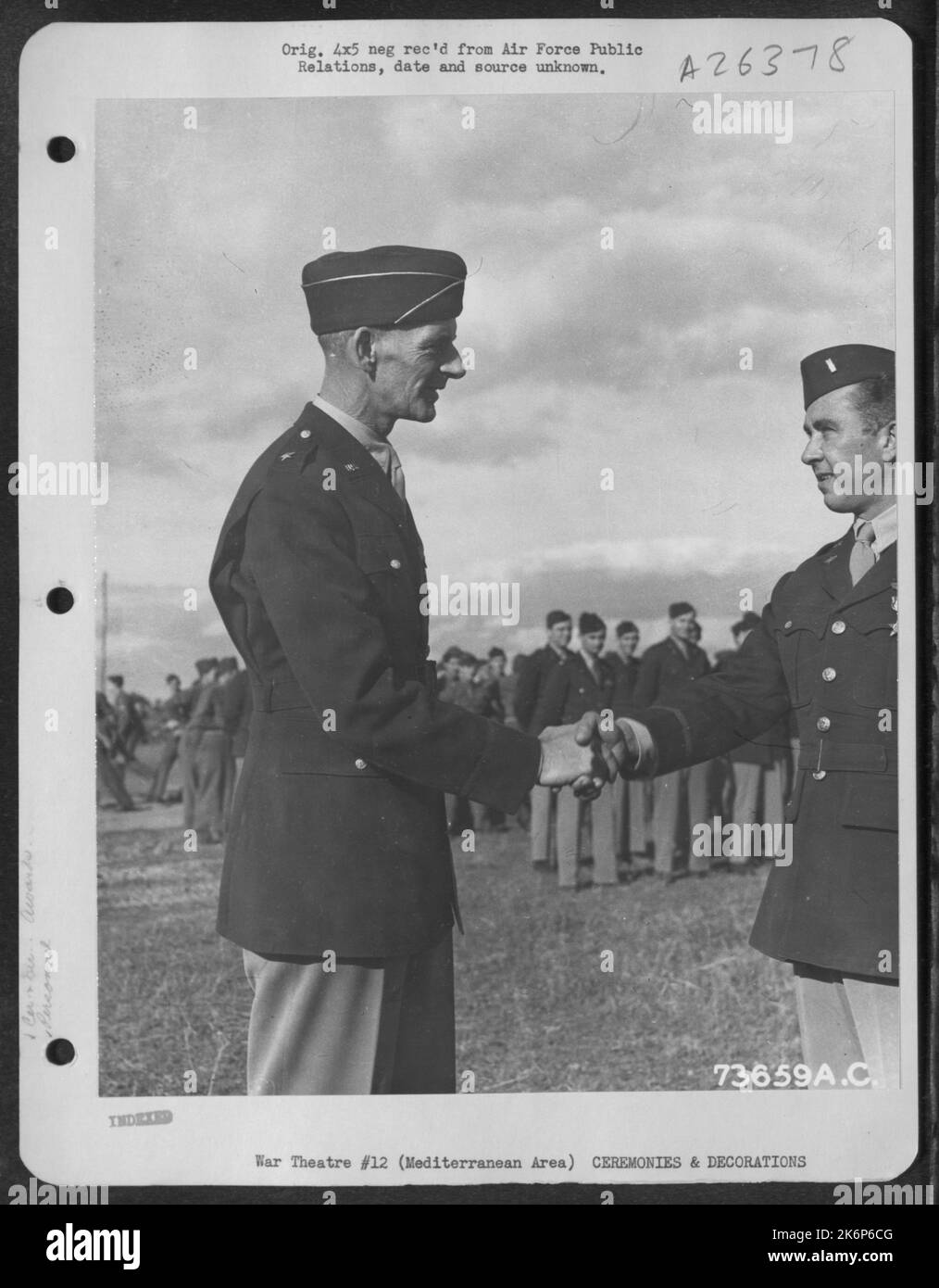 1st Lt. Floyd H. Richards, Dalhart, Texas, is congratulated by Brig ...