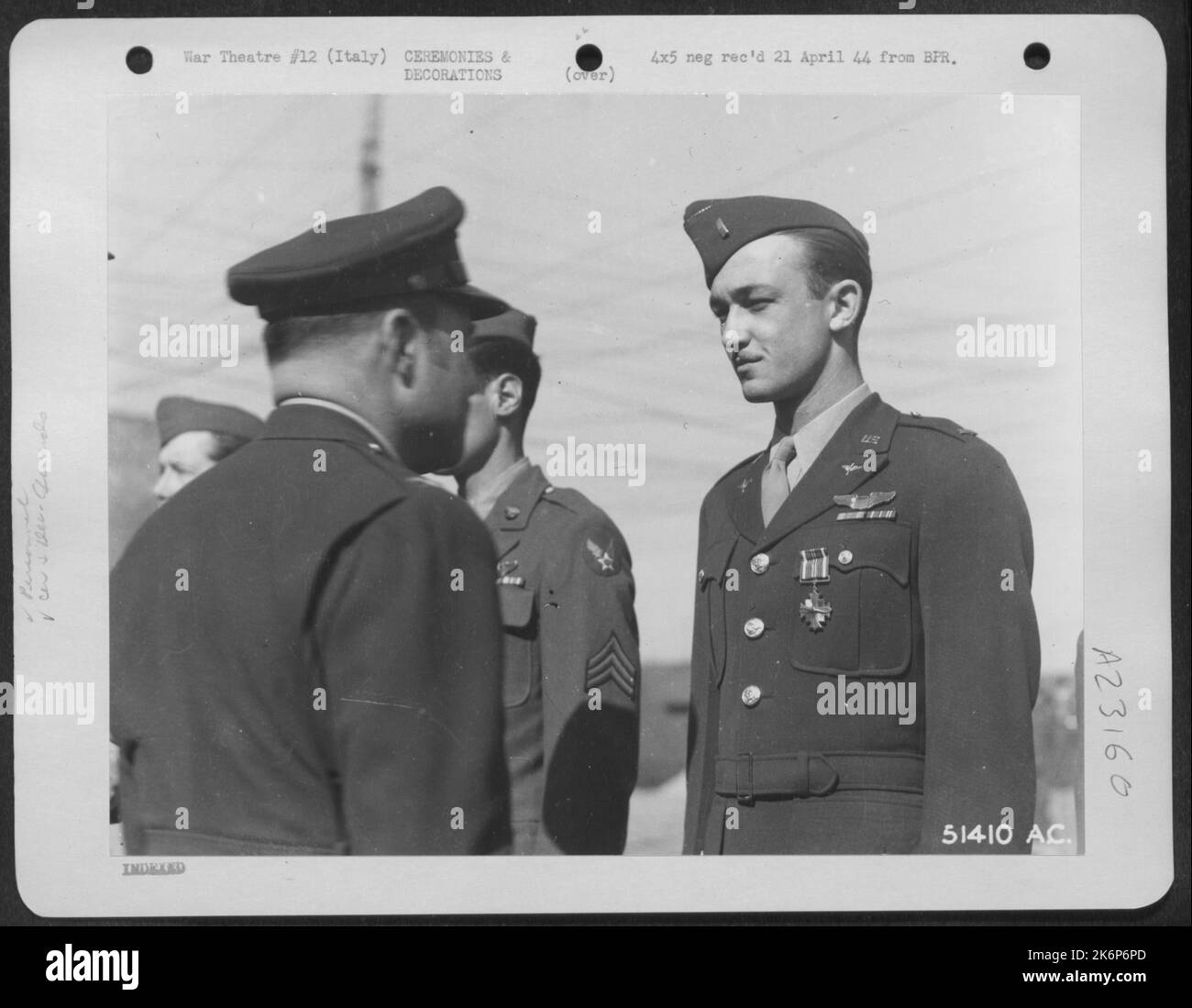 Colonel Rush, Commanding Officer of the Wing has just presented the ...