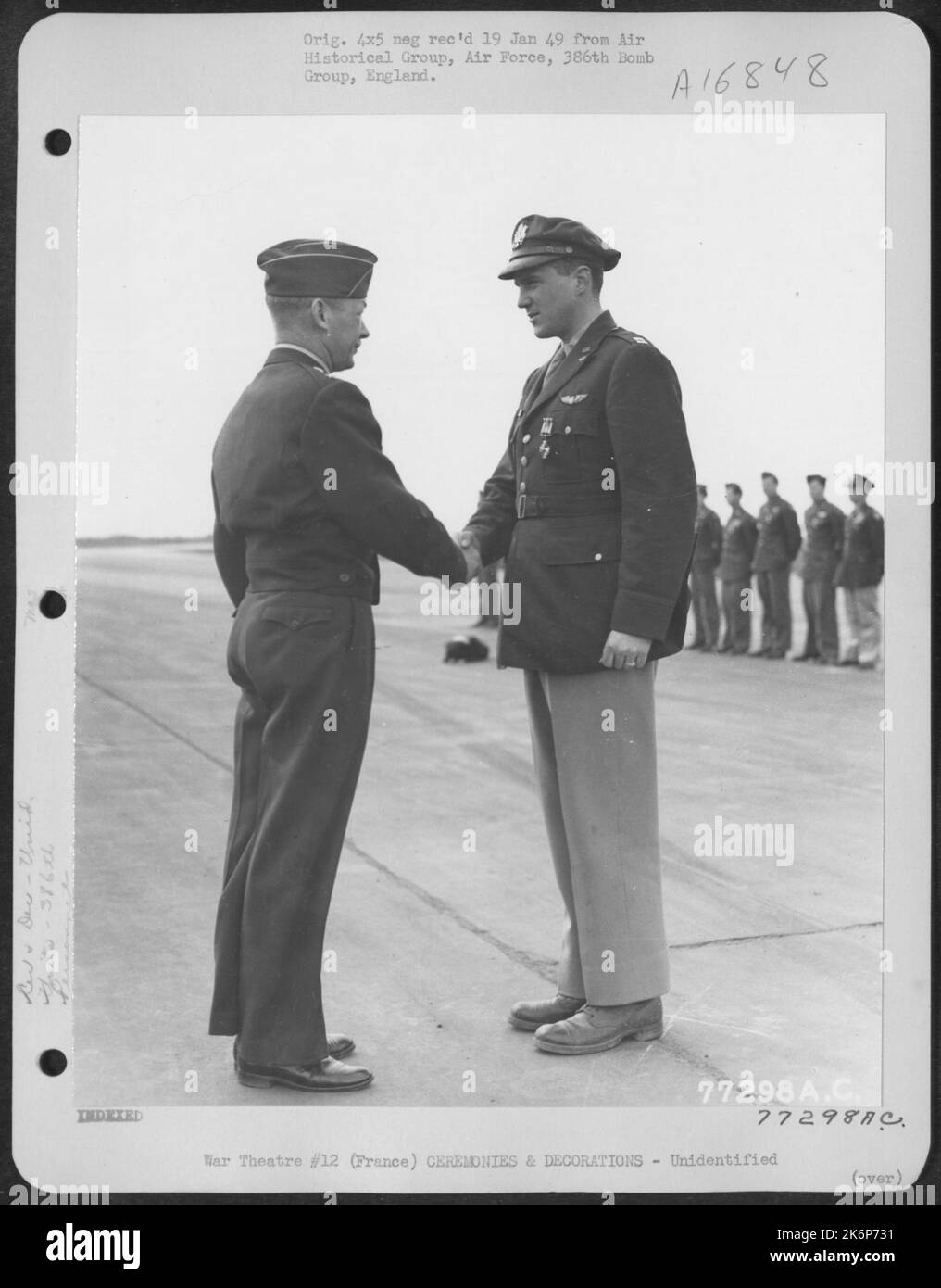 Major General Samuel E. Anderson Congratulates An Officer Of The 386Th ...