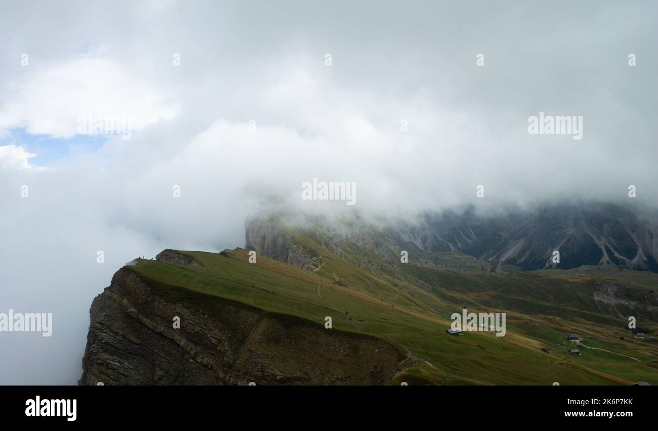 Fog over the epic Mount Seceda at the Dolomites Stock Photo - Alamy
