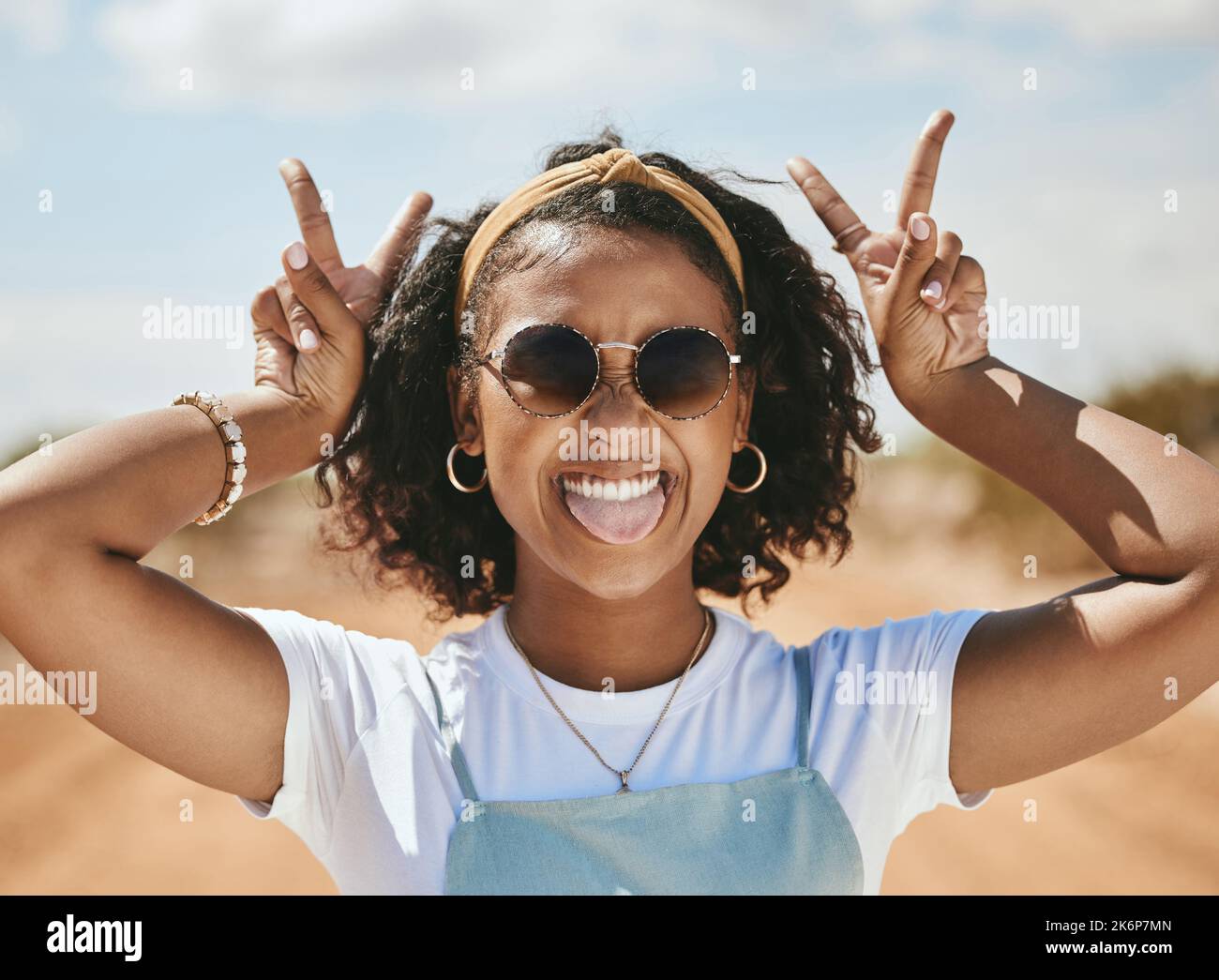 Peace, portrait and happy gen z girl on summer holidays, vacation or ...