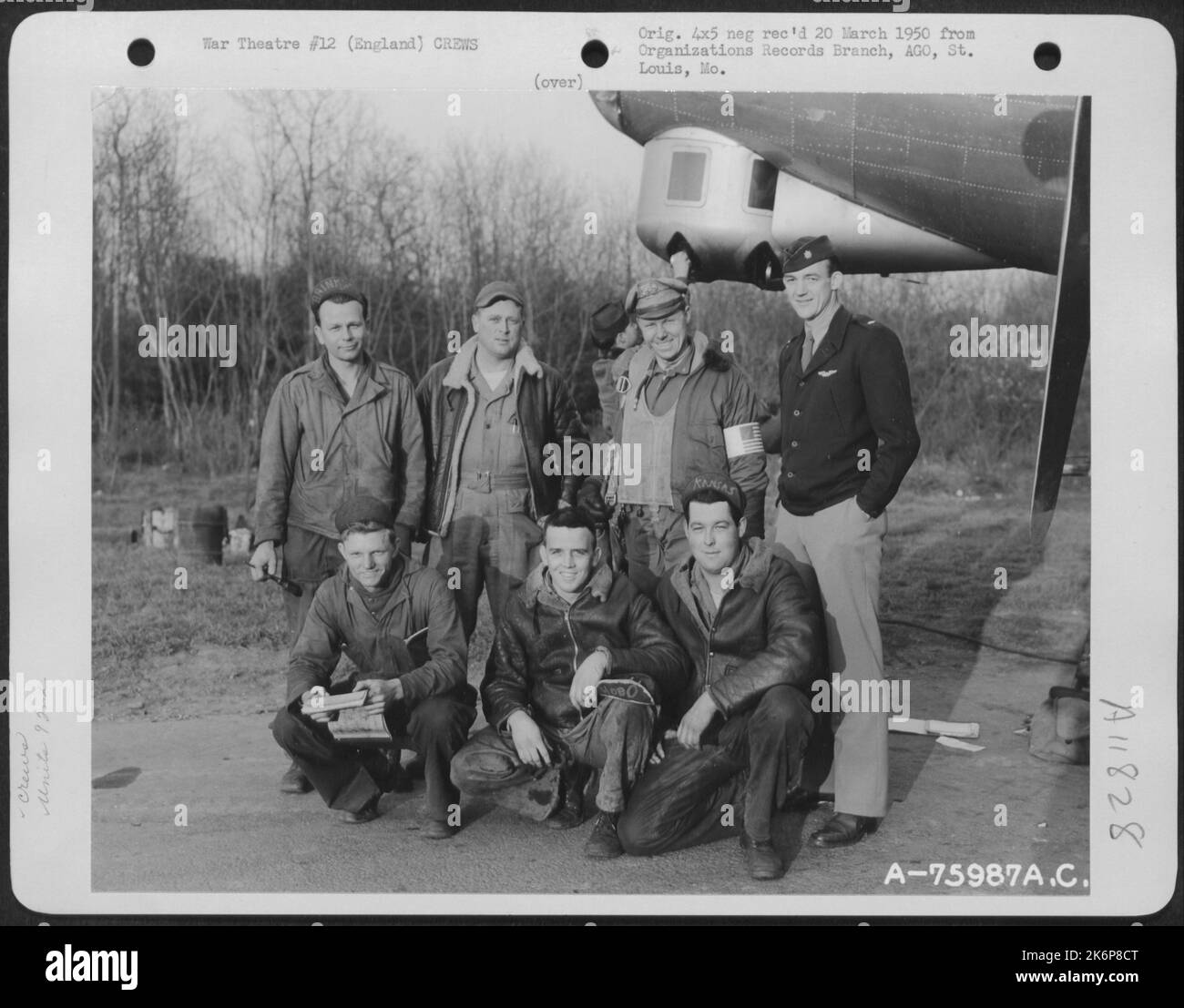 Crew Members Of The 92Nd Bomb Group Pose Beside A Boeing B-17 At An ...