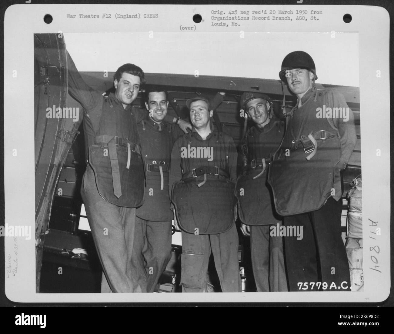 A Crew Of The 439Nd Troop Carrier Pose By The Douglas C-47 Prior To ...