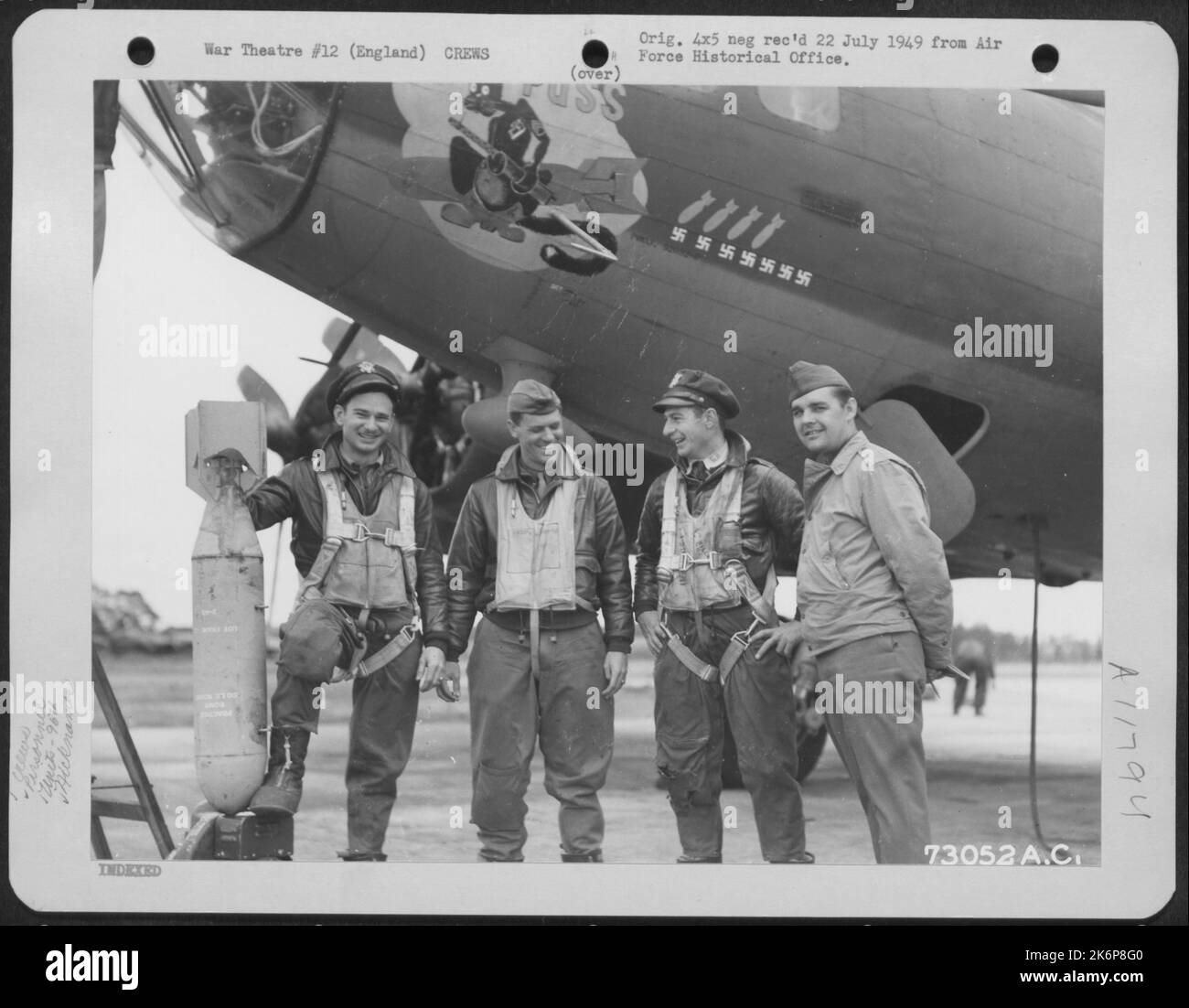 Major Hand and crew of the 96th Bomb Group pose beside their Boeing B ...