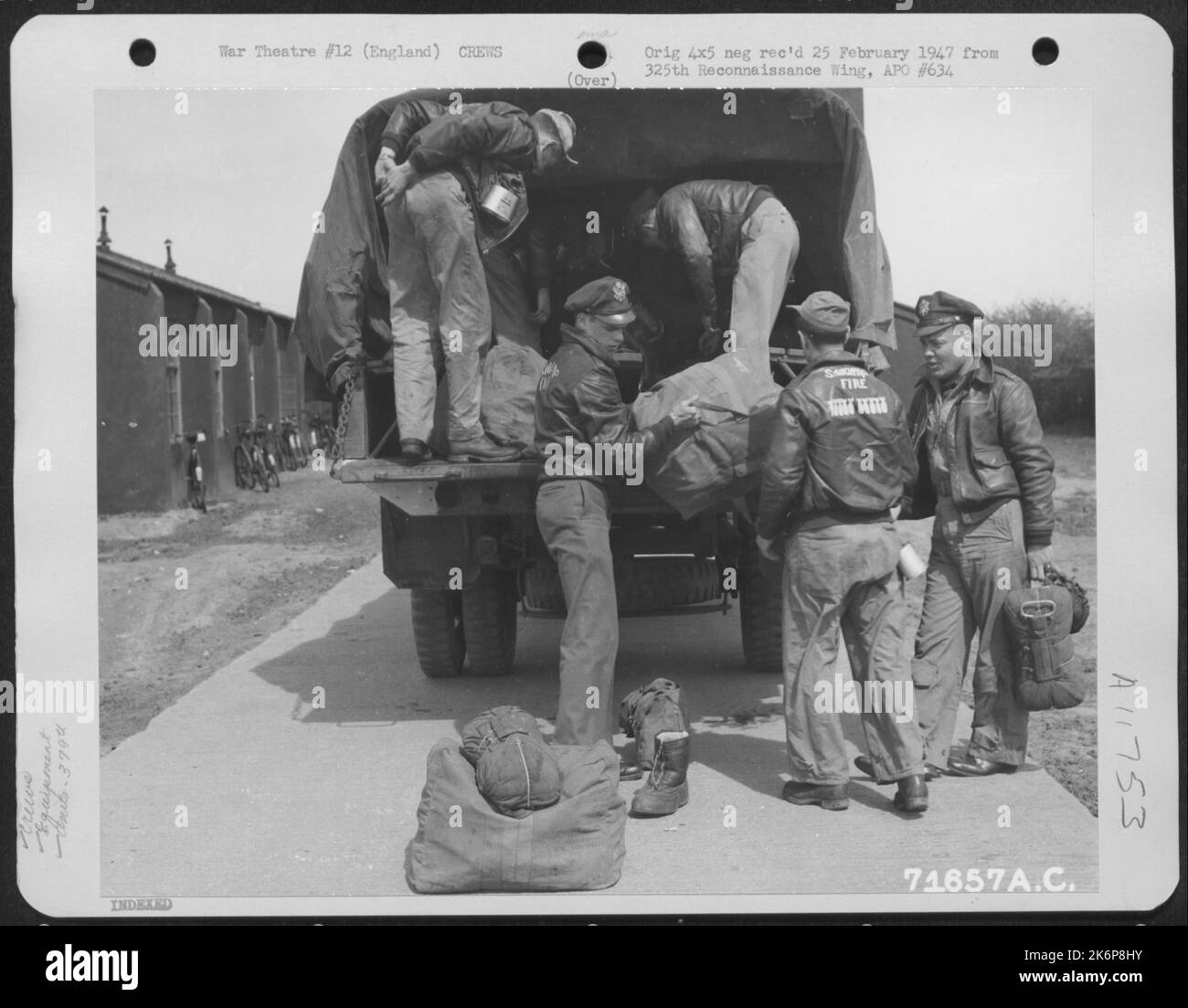 After Briefing, Crew Members Of The Boeing B-17 'Swamp Fire' Load The ...