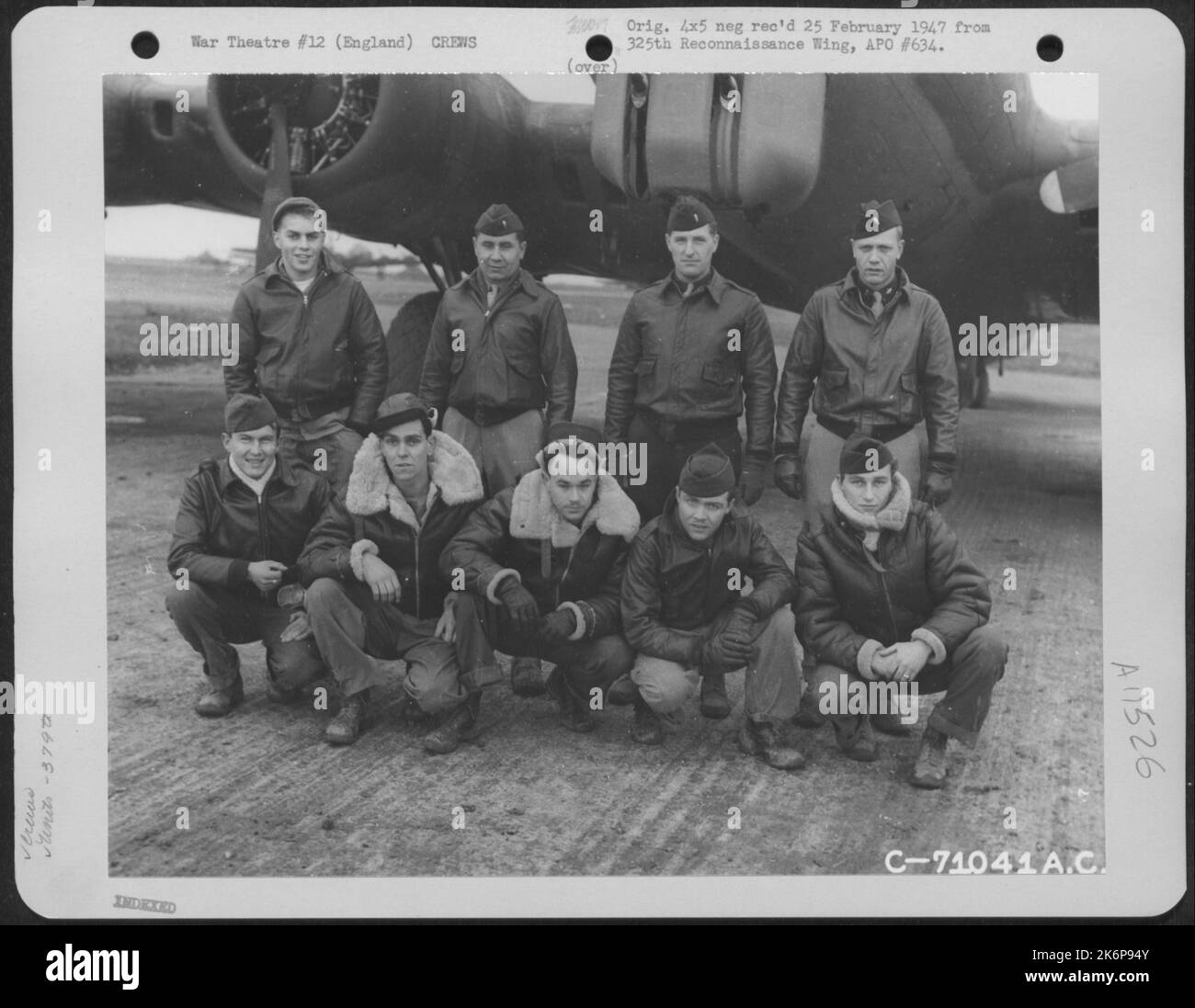 A Crew Of The 379Th Bomb Group Poses Beside A Boeing B-17 "Flying ...
