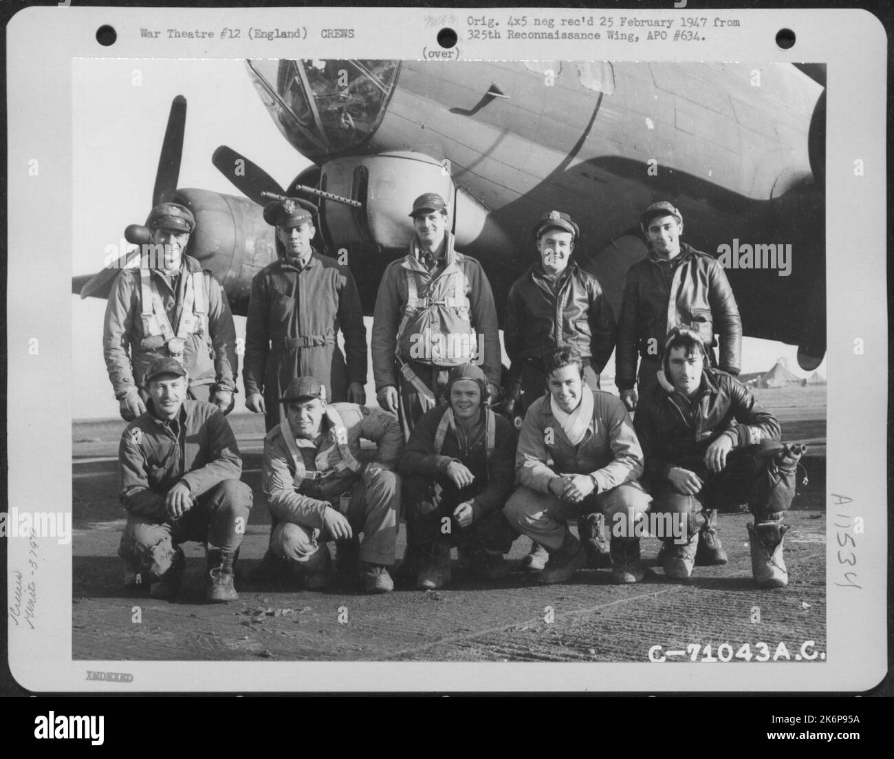 A Crew Of The 379Th Bomb Group Poses Beside A Boeing B-17 "Flying ...