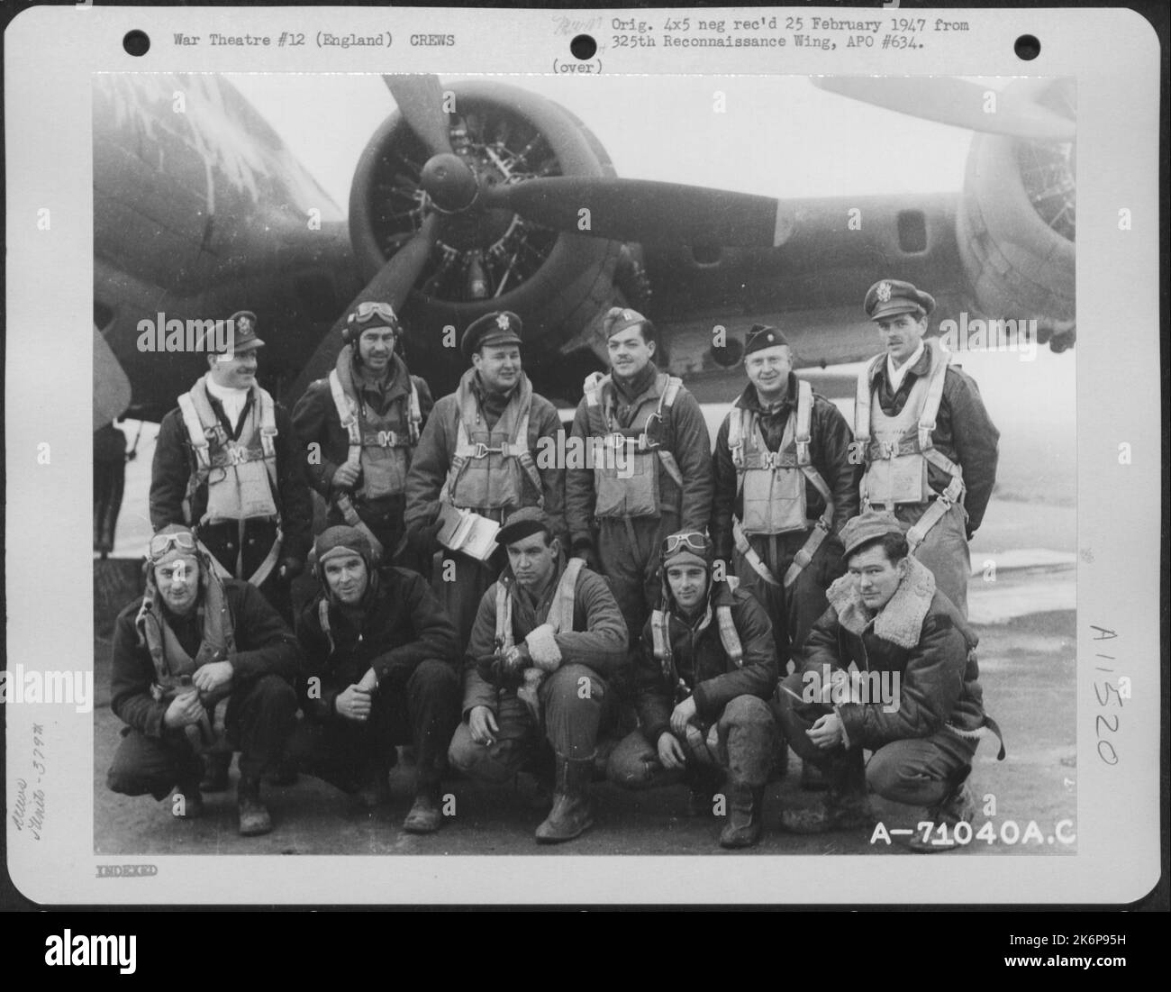 A Crew Of The 379Th Bomb Group Poses Beside A Boeing B-17 "Flying ...