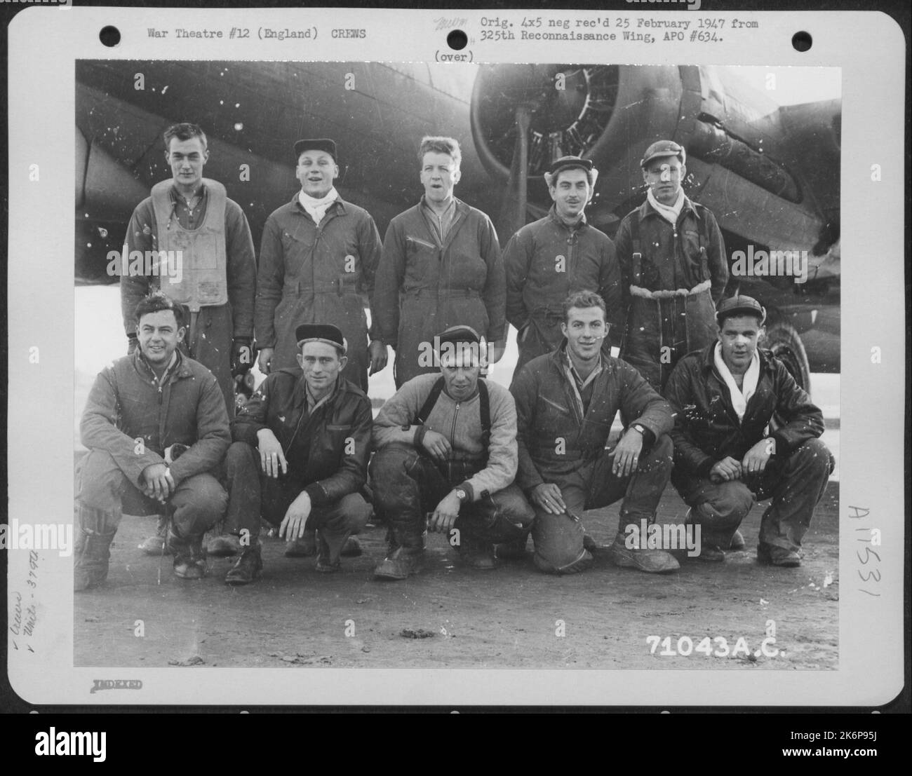 A Crew Of The 379Th Bomb Group Poses Beside A Boeing B-17 "Flying ...