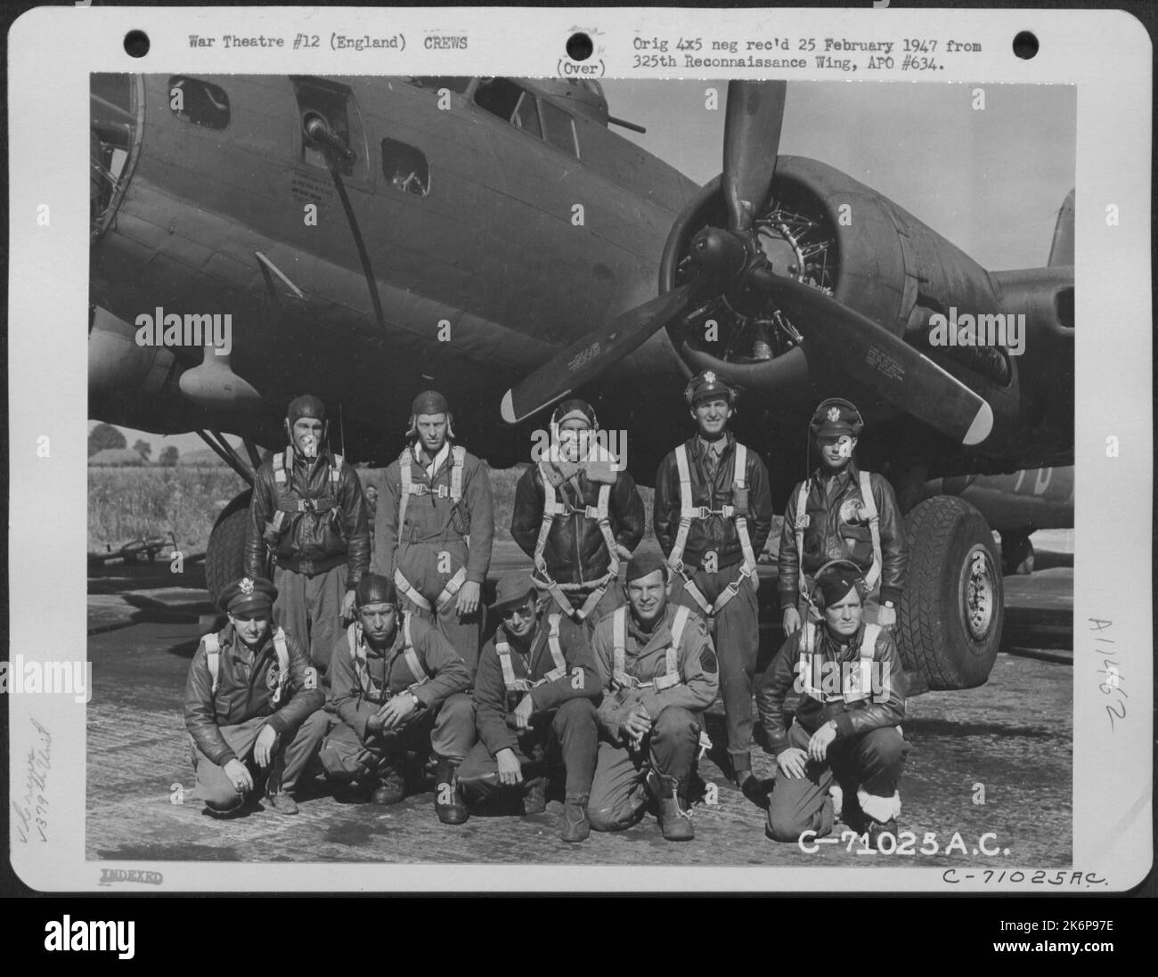 A Crew Of The 379Th Bomb Group Poses Beside A Boeing B-17 "Flying ...