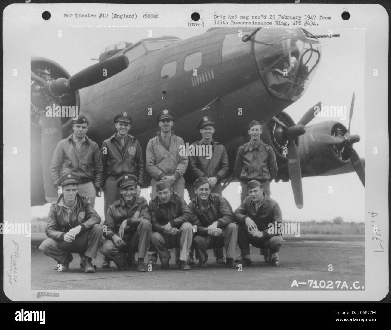 A Crew Of The 379Th Bomb Group Poses Beside A Boeing B-17 "Flying ...