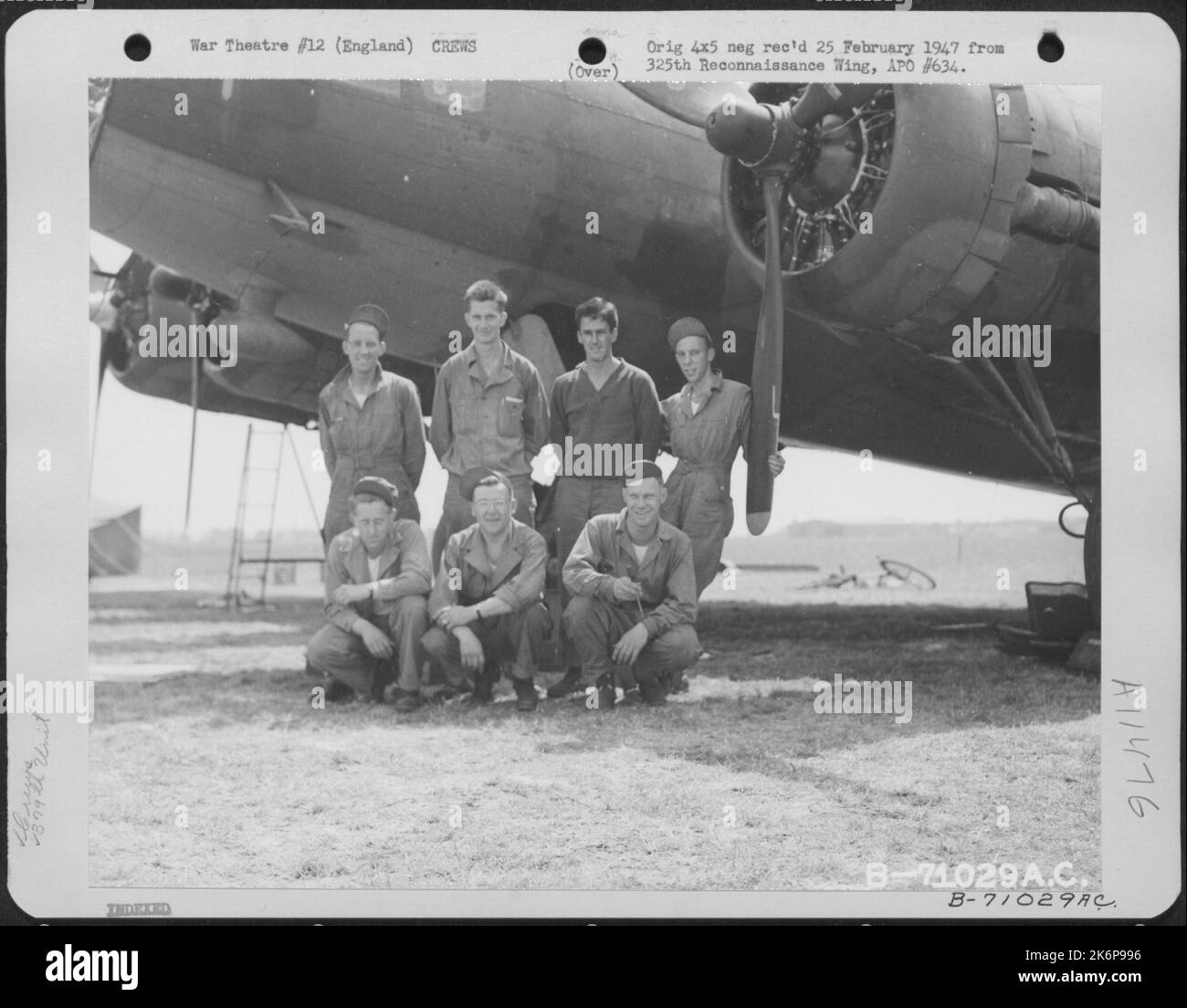 A Crew Of The 379Th Bomb Group Poses Beside A Boeing B-17 "Flying ...