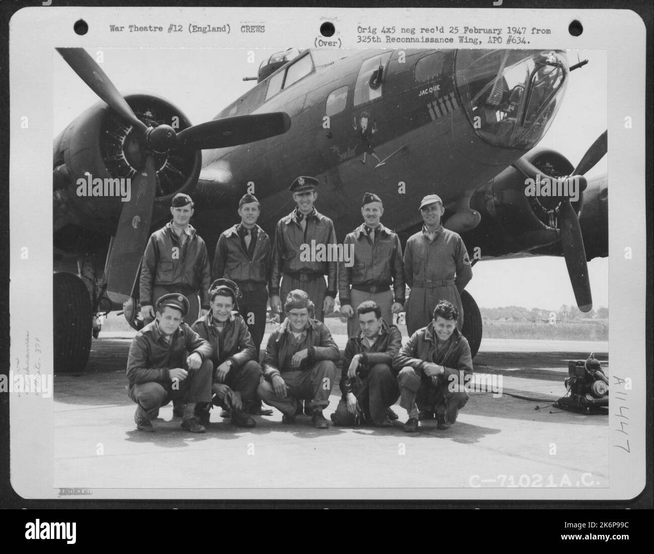 A Crew Of The 379Th Bomb Group Poses Beside A Boeing B-17 "Flying ...