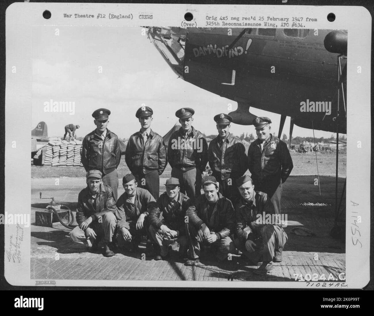 A Crew Of The 379Th Bomb Group Poses Beside A Boeing B-17 "Flying ...