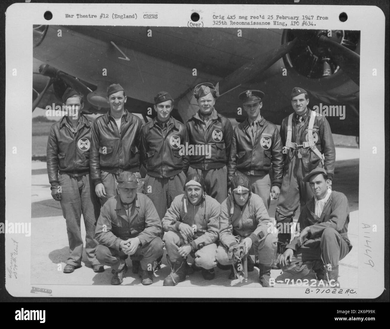 A Crew Of The 379Th Bomb Group Poses Beside A Boeing B-17 "Flying ...