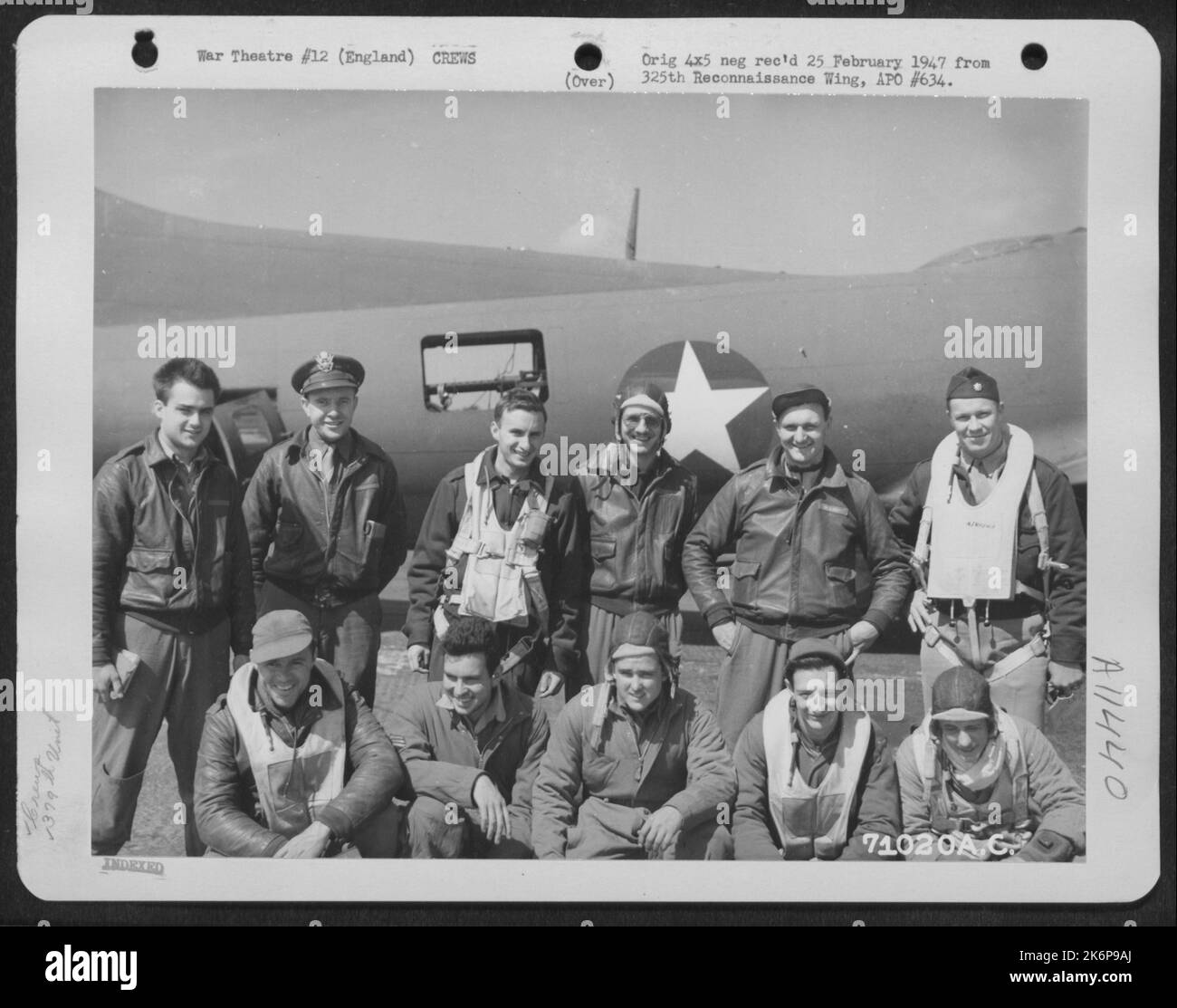 A Crew Of The 379Th Bomb Group Poses Beside A Boeing B-17 "Flying ...