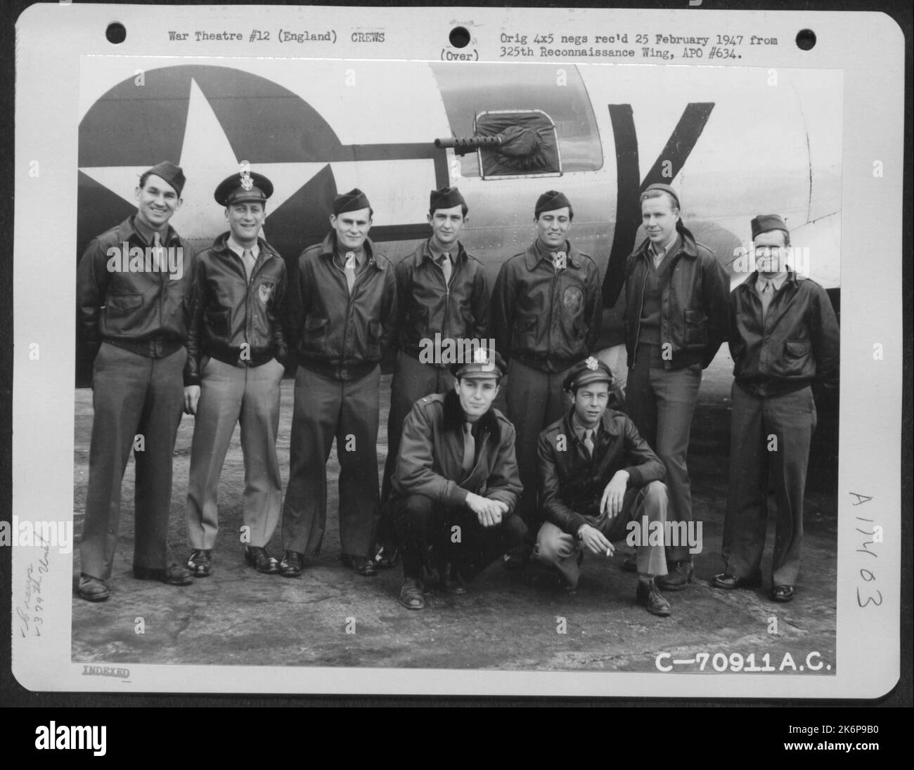 A Crew Of The 379Th Bomb Group Poses In Front Of A Boeing B-17 "Flying ...