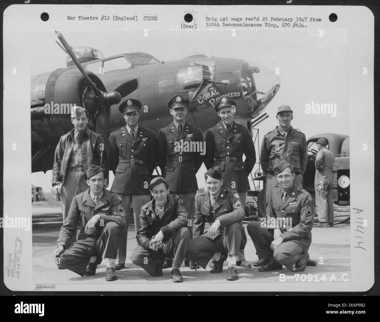 A Crew Of The 379Th Bomb Group Poses In Front Of A Boeing B-17 "Coral ...