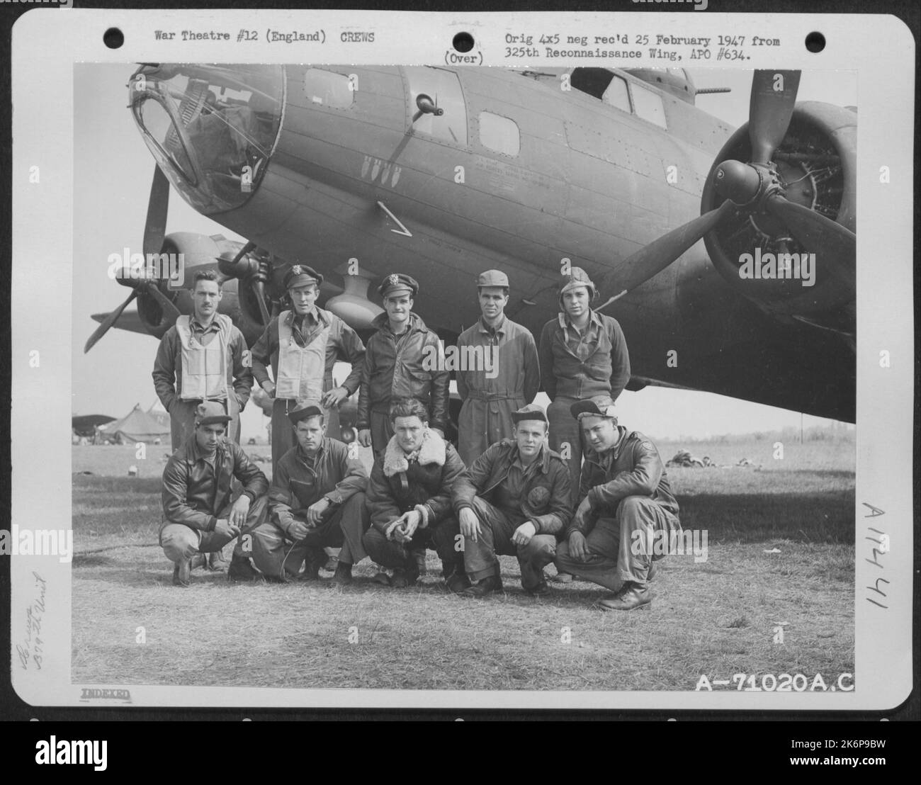 A Crew Of The 379Th Bomb Group Poses Beside A Boeing B-17 "Flying ...
