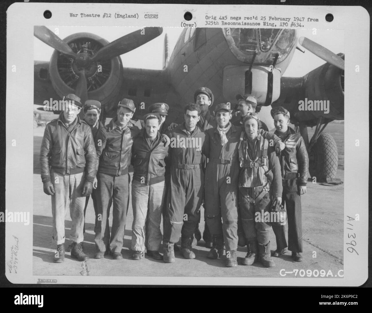 A Crew Of The 379Th Bomb Group Poses In Front Of A Boeing B-17 "Flying ...