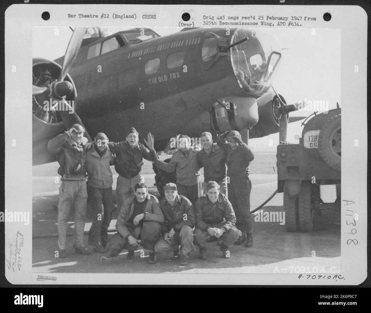 A Crew Of The 379Th Bomb Group Poses In Front Of A Boeing B-17 "Flying ...