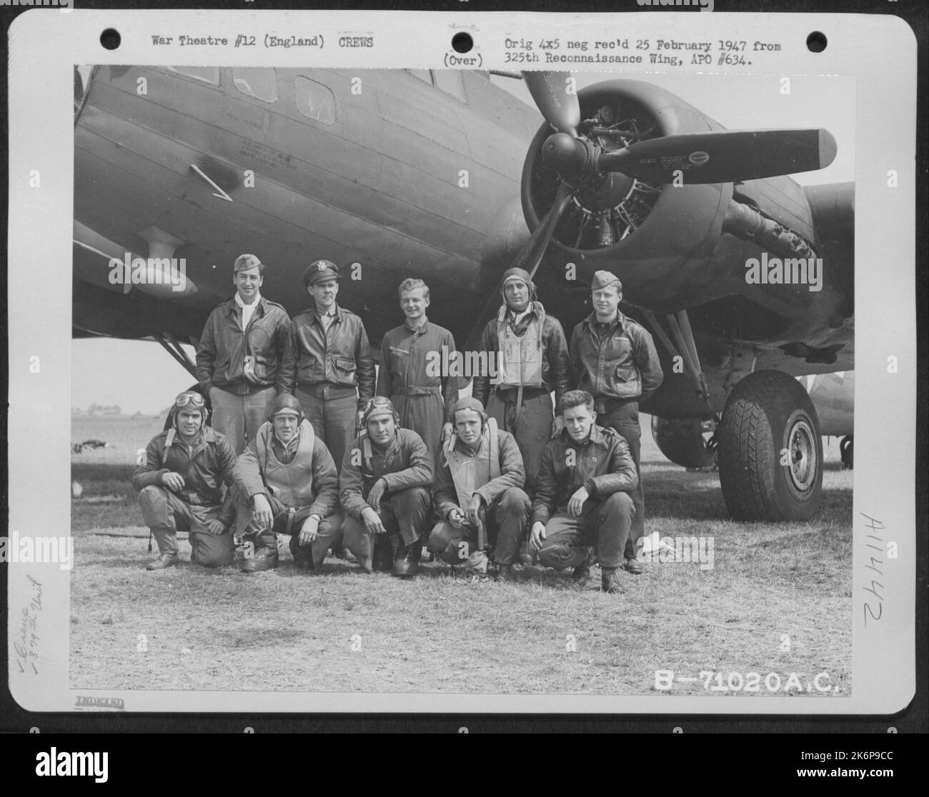 A Crew Of The 379Th Bomb Group Poses Beside A Boeing B-17 "Flying ...