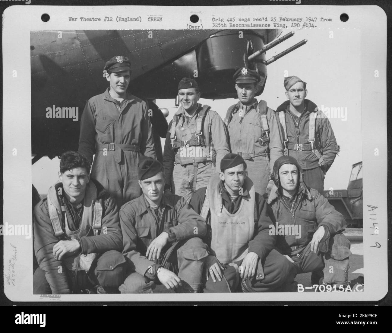 A Crew Of The 379Th Bomb Group Poses In Front Of A Boeing B-17 "Flying ...