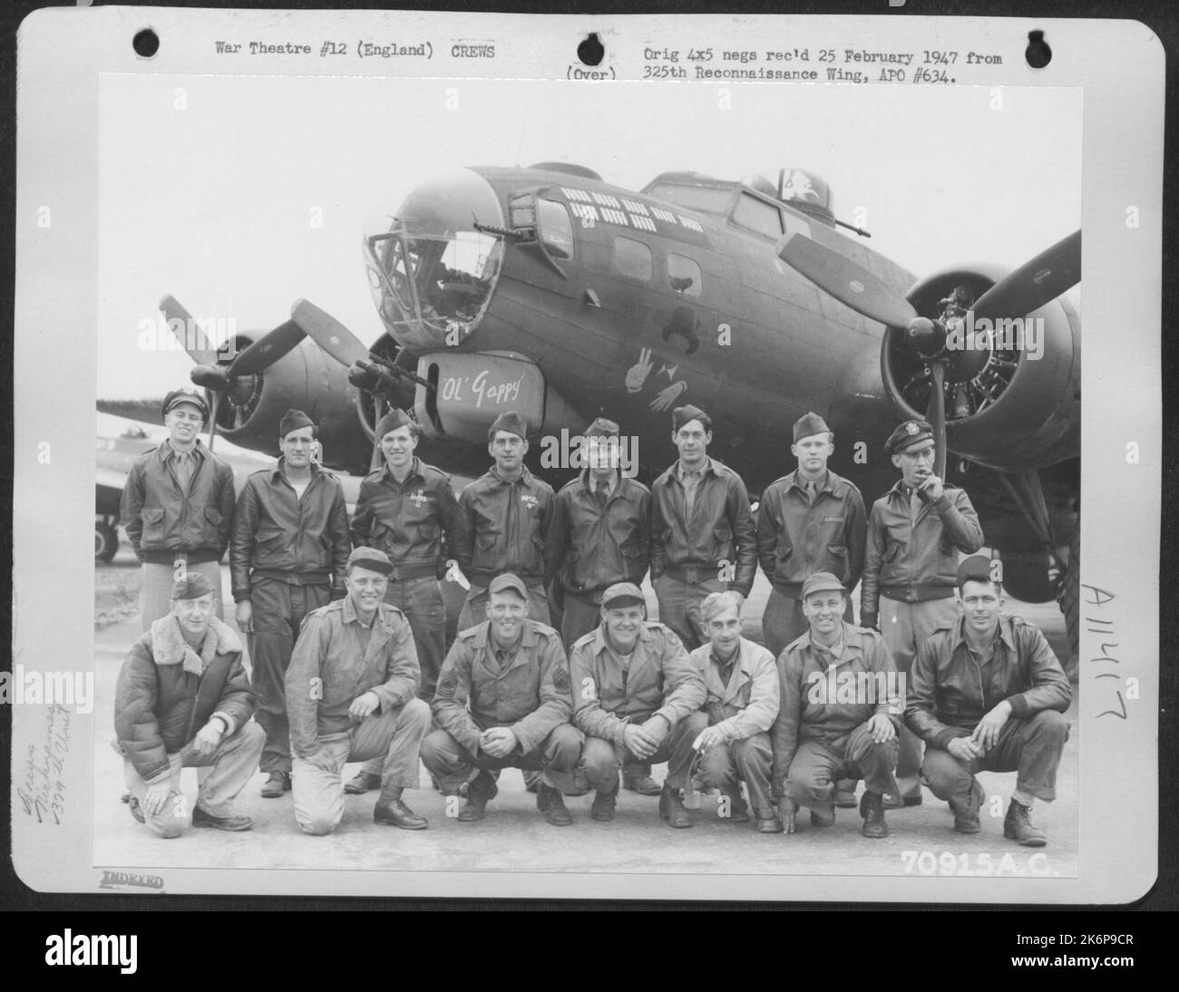 A Crew Of The 379Th Bomb Group Poses In Front Of A Boeing B-17 'Ol ...