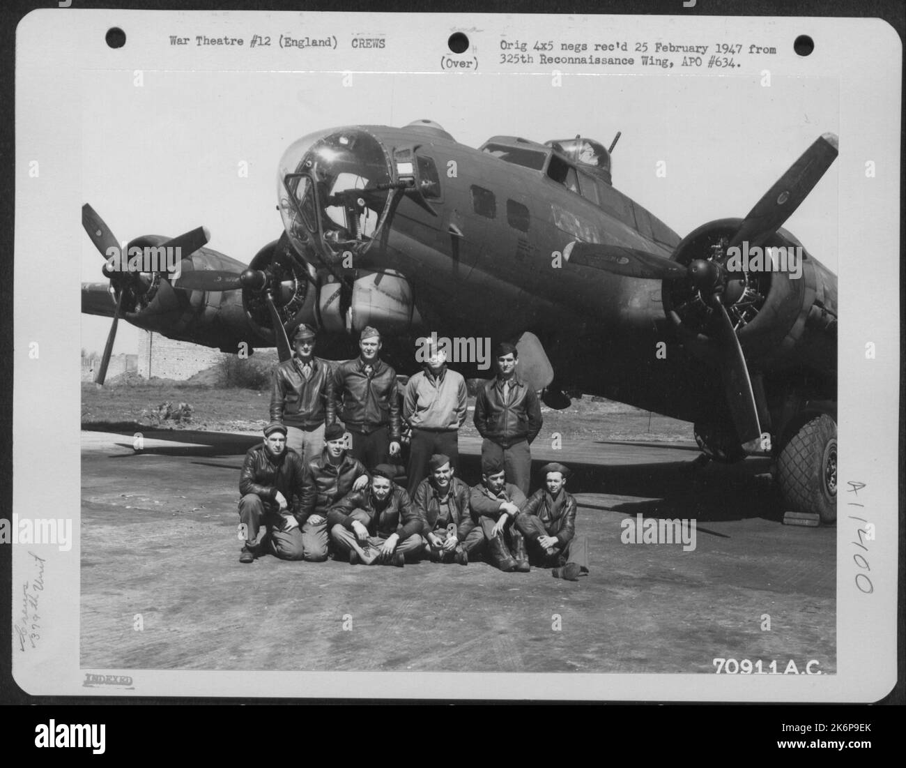 A Crew Of The 379Th Bomb Group Poses In Front Of A Boeing B-17 "Flying ...