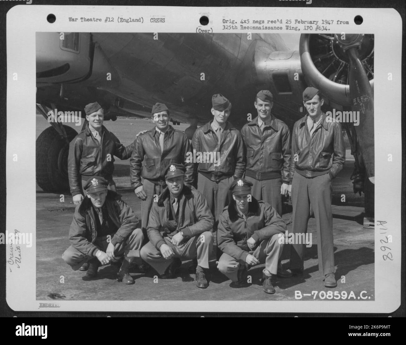 A Crew Of The 379Th Bomb Group Poses In Front Of A Boeing B-17 "Flying ...